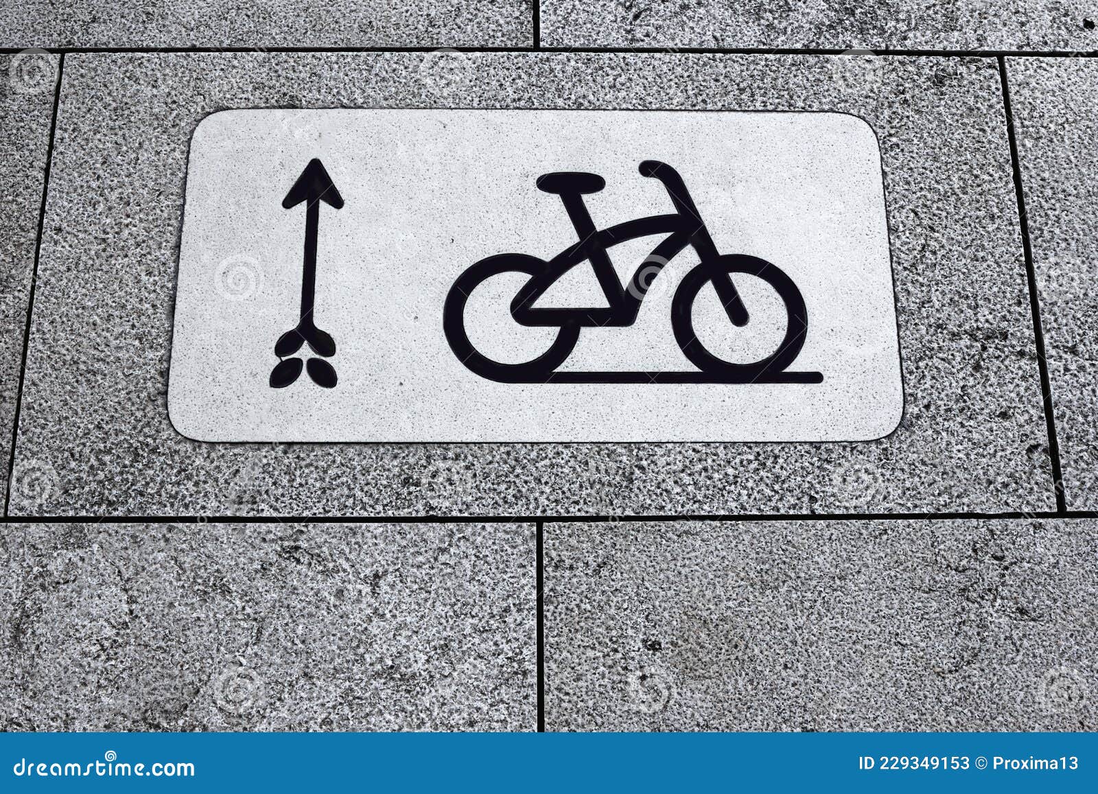 Bicycle Sign and Arrow on Paving Slabs in the Park Stock Image - Image ...