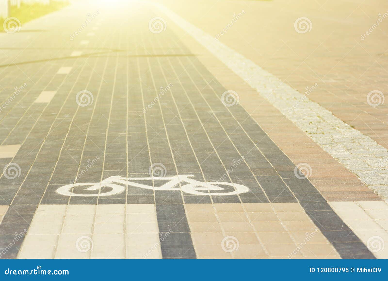 Bicycle Sign on a Bikeway Marked with Lines and Dashed Lane Separator ...