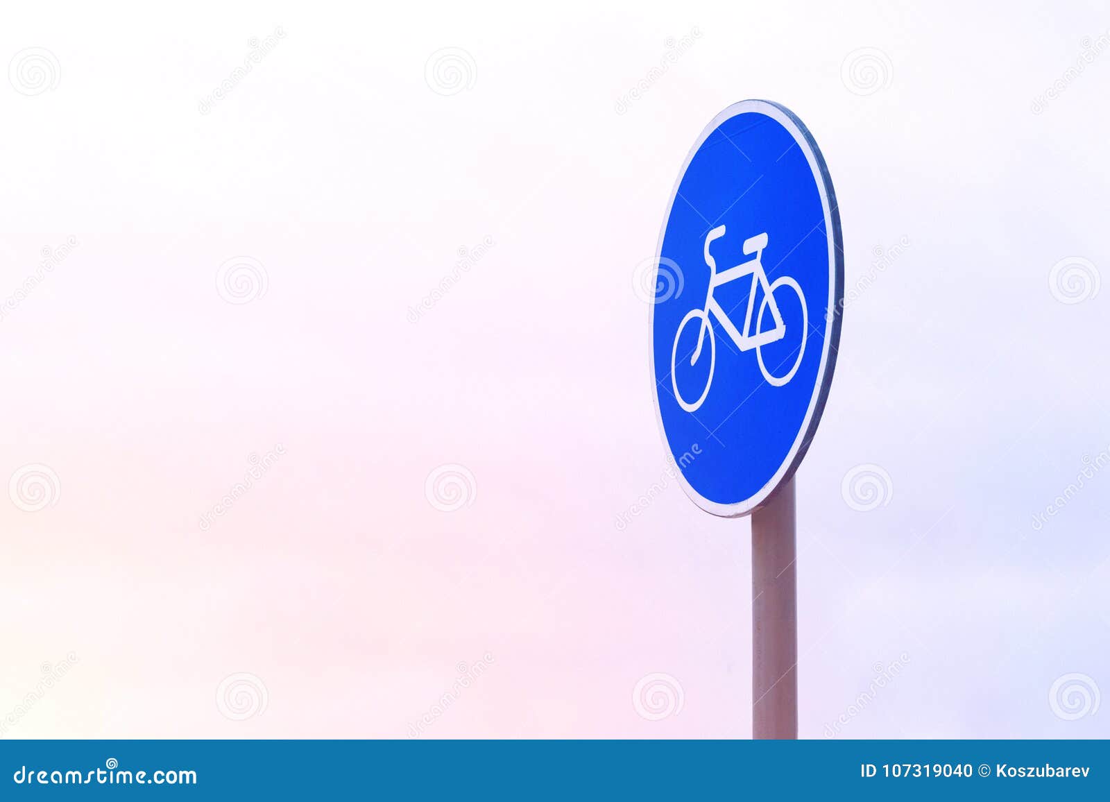 Bicycle Sign in Blue Circle on Light Background with Copyspace Stock ...
