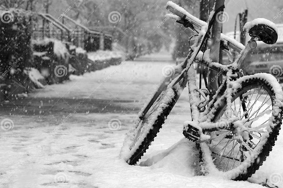 Bicycle, Snowed in stock image. Image of black, sidewalk - 4359589