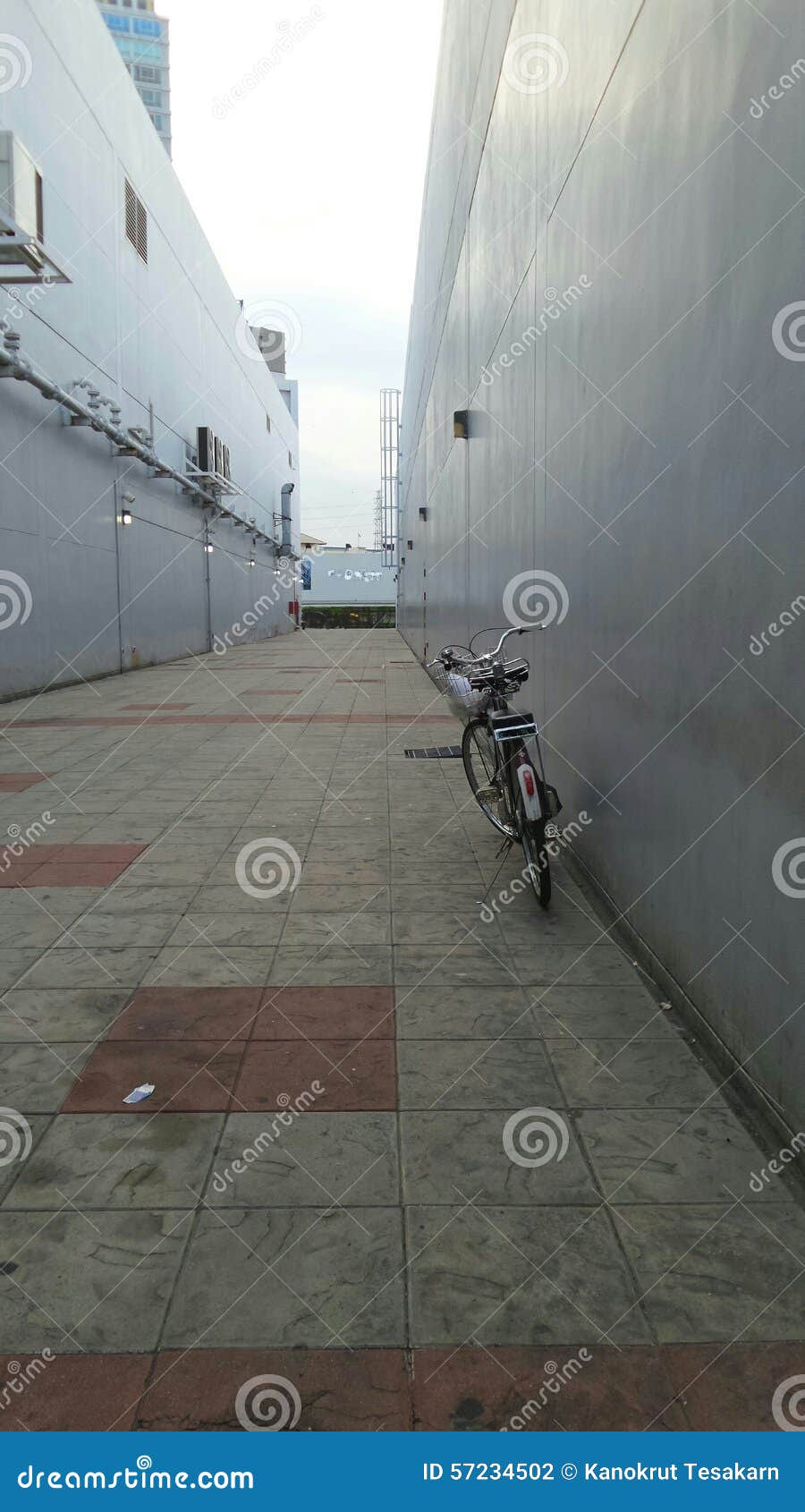 Bicycle stop in small lane stock photo. Image of lane - 57234502