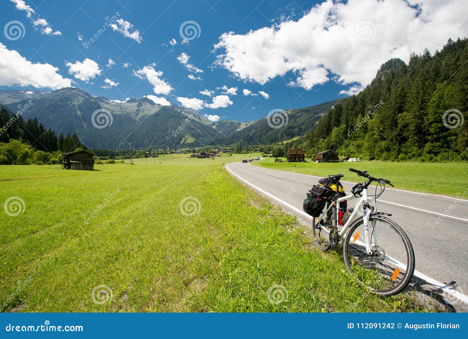 Bicycle touring in Austria stock photo. Image of field - 112091242