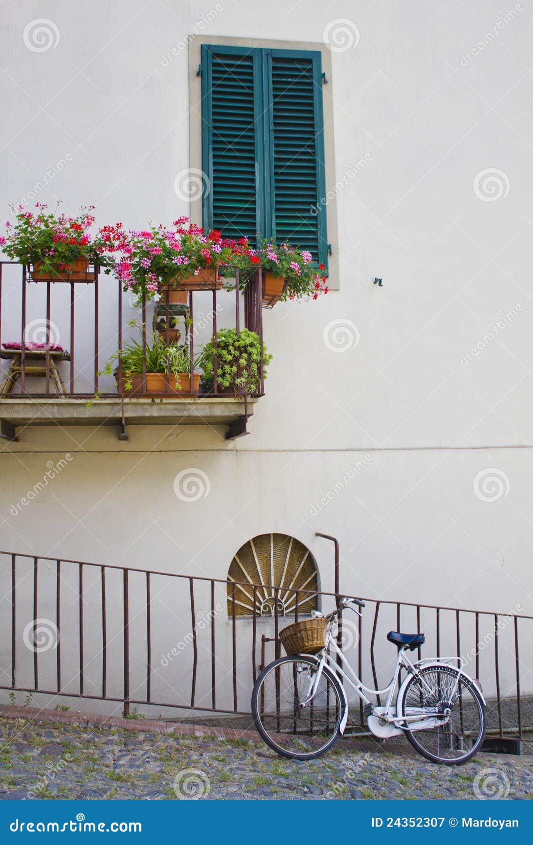 Bicycle under the balcony stock image. Image of balcony - 24352307