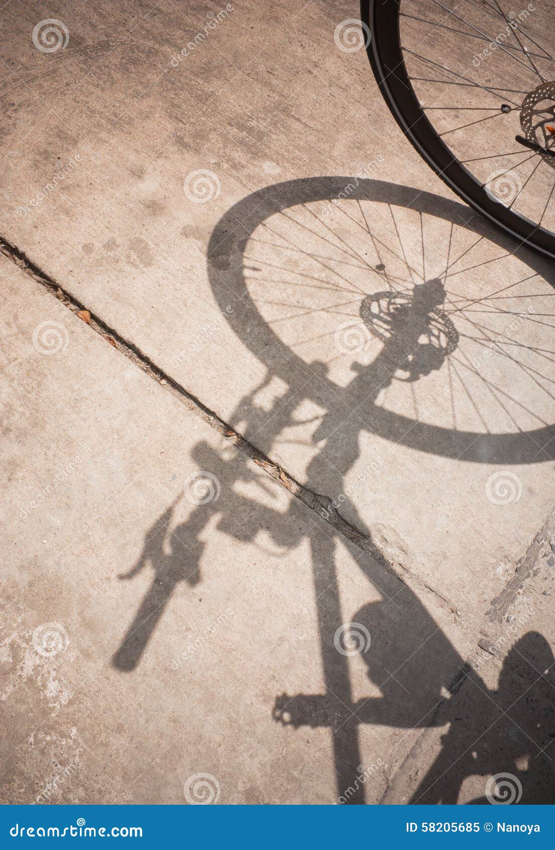 Bicycle wheel and shadow stock image. Image of urban - 58205685