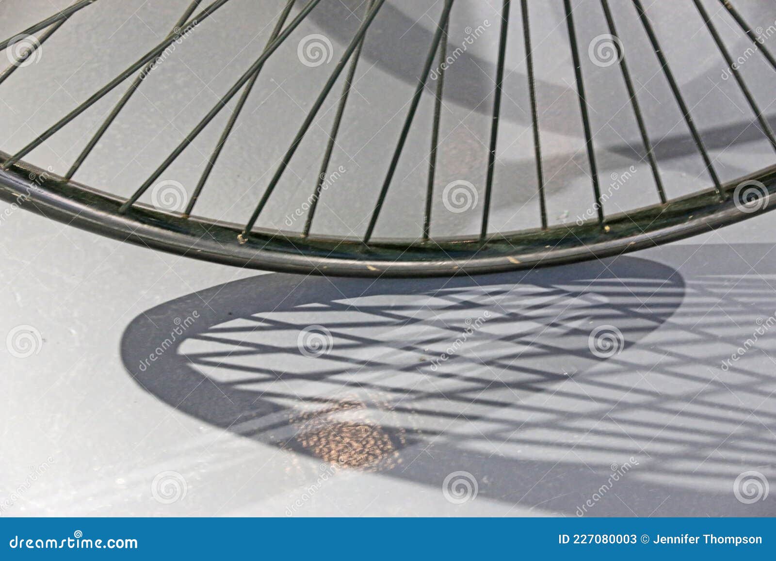 Bicycle wheel and shadow stock image. Image of biking - 227080003