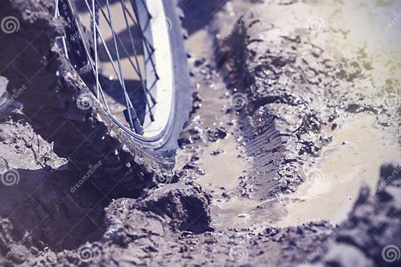 The Bicycle Wheel is Stuck in the Mud. Close Up Stock Image - Image of ...