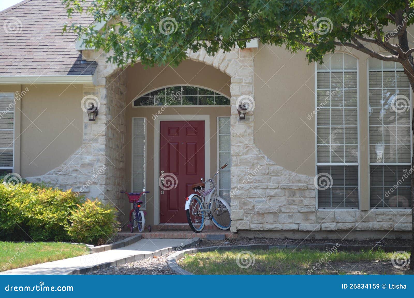 Bicycles at the front door stock image. Image of house - 26834159