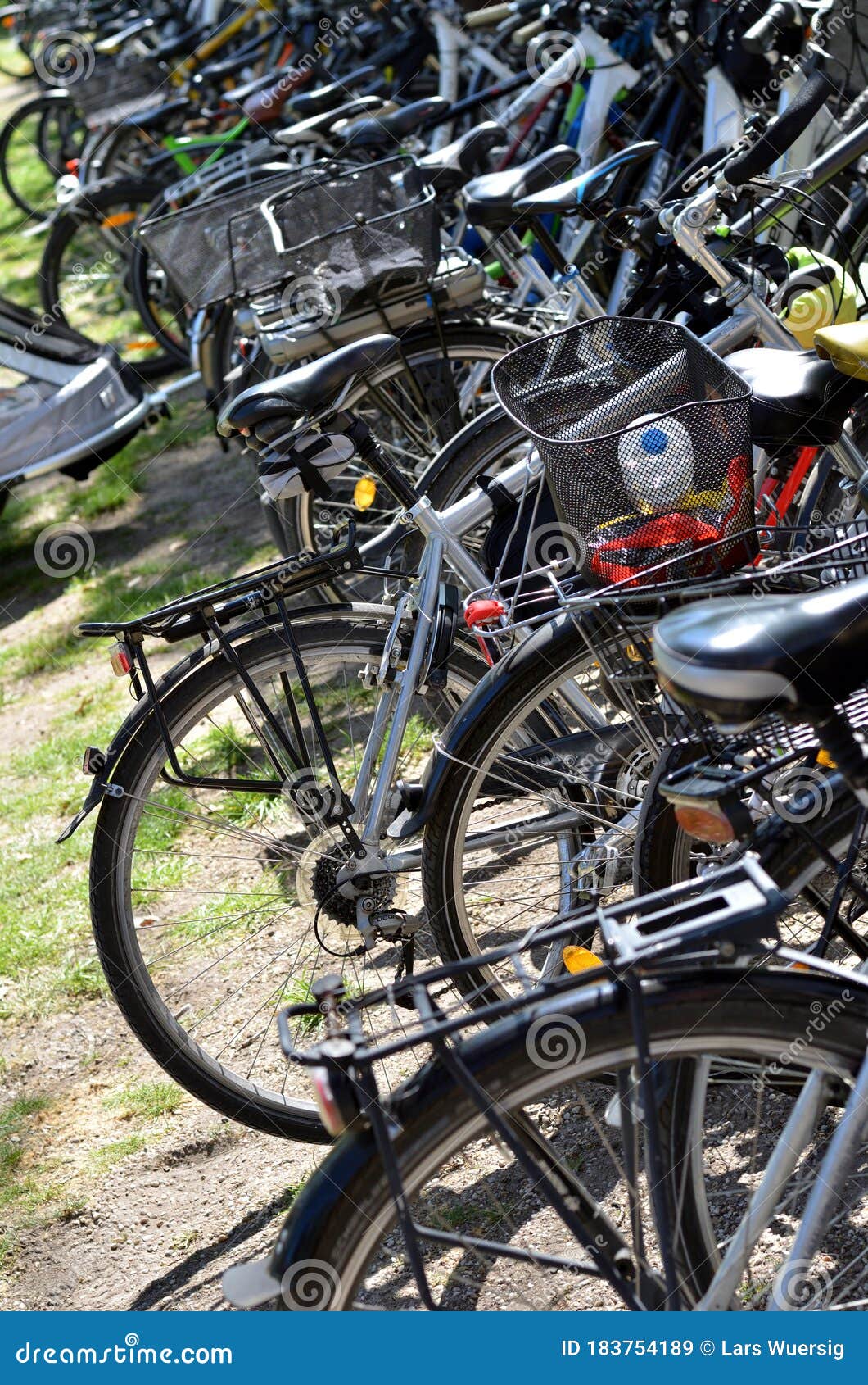Bicycles Parked in a Row on a Bicycle Parking Lot Stock Image - Image ...