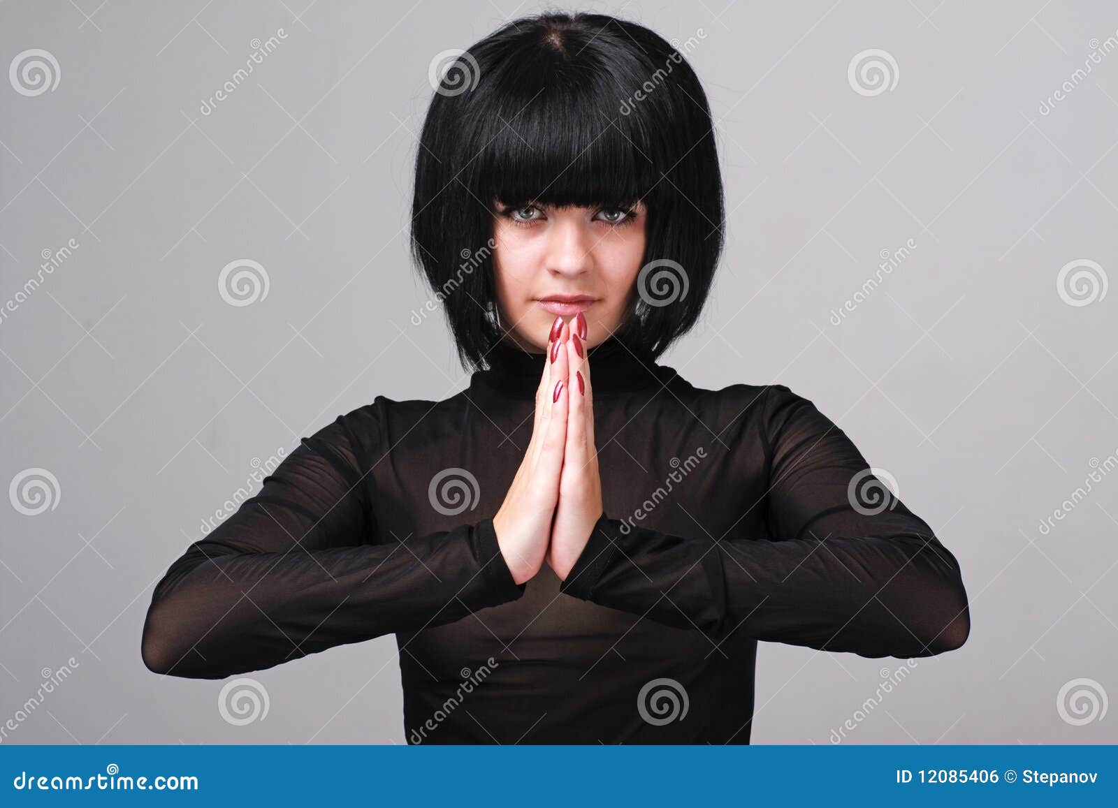 Biddende vrouw stock foto. Image of handen, gezicht, schoonheid - 12085406