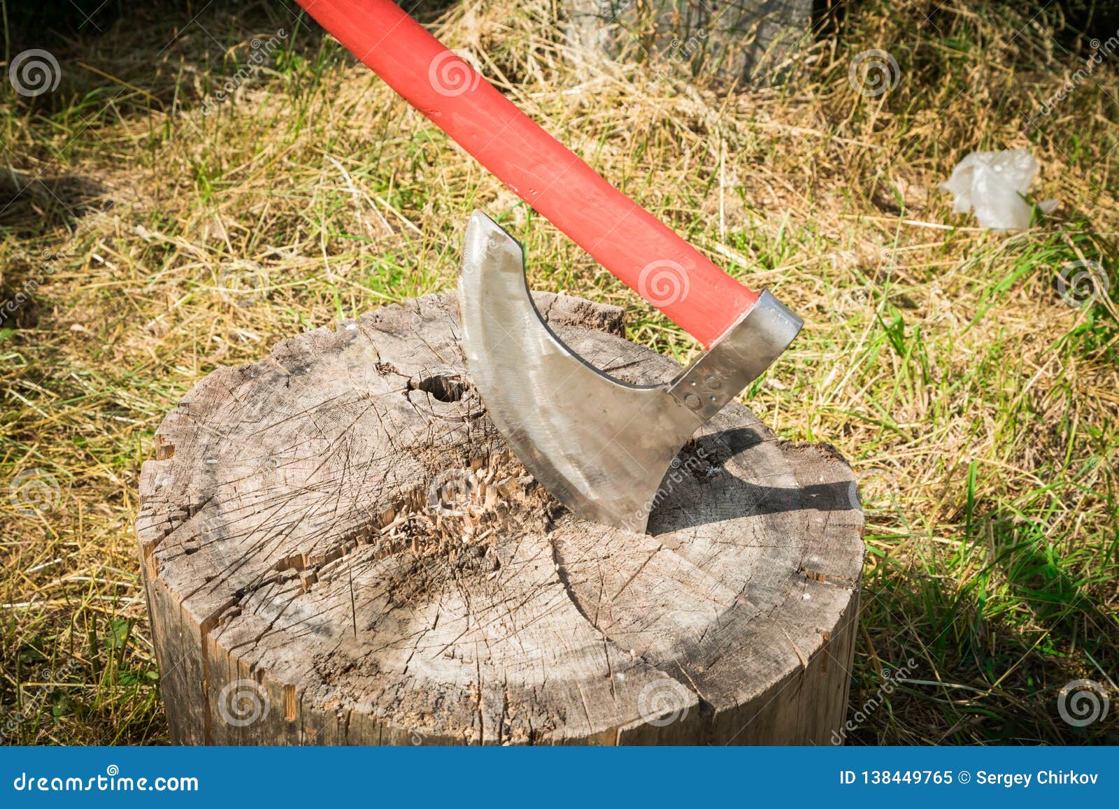 The big axe cuts a tree stock image. Image of industry - 138449765