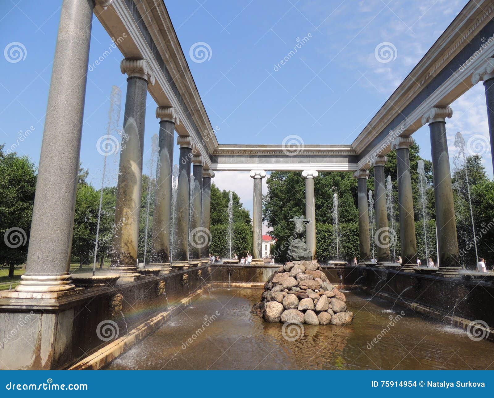 A Big Beautiful Fountain with Columns Stock Photo - Image of rainbow ...