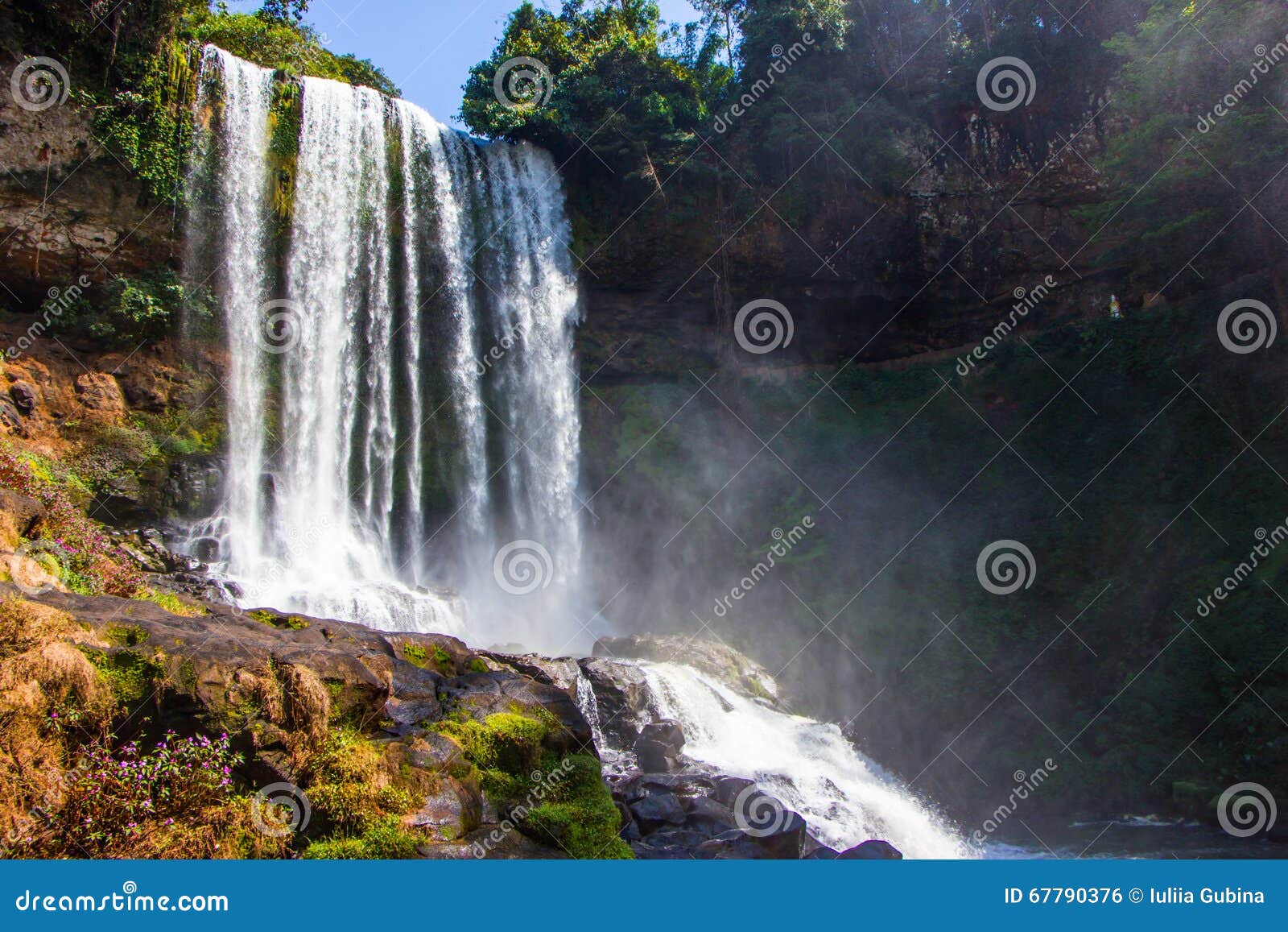 Big beautiful waterfall stock photo. Image of flowing - 67790376
