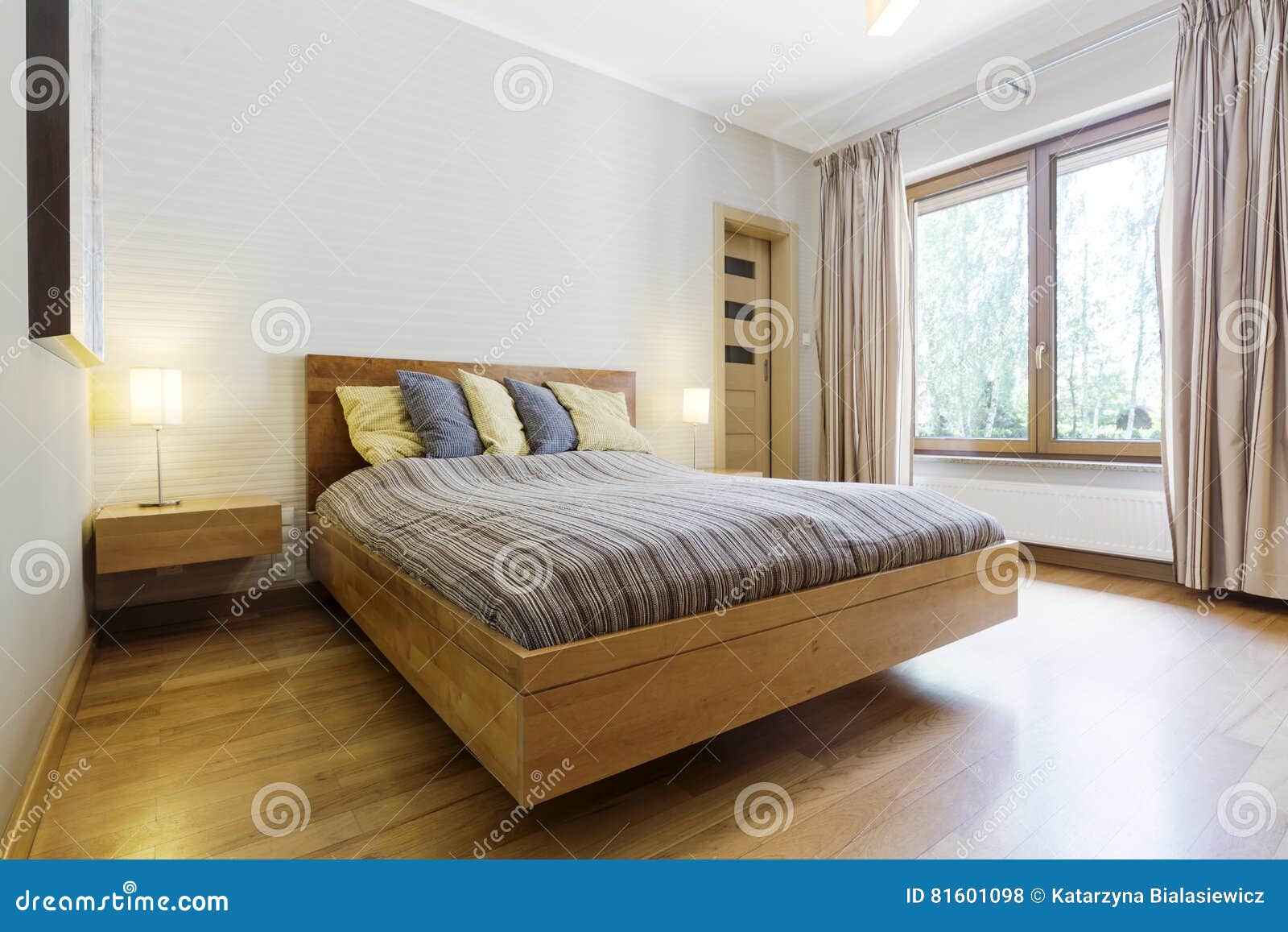 Big bed in the bedroom stock photo. Image of home, modern - 81601098