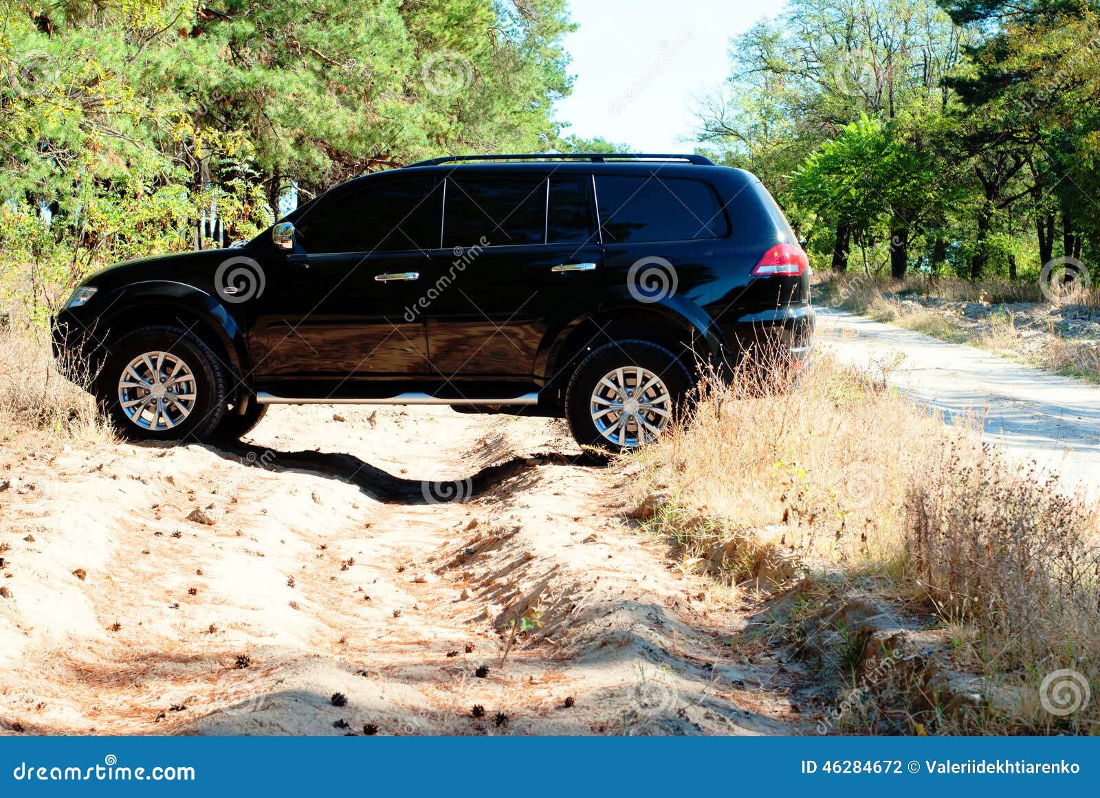 Big Black Car Drives Off the Forest Road Stock Photo - Image of green ...