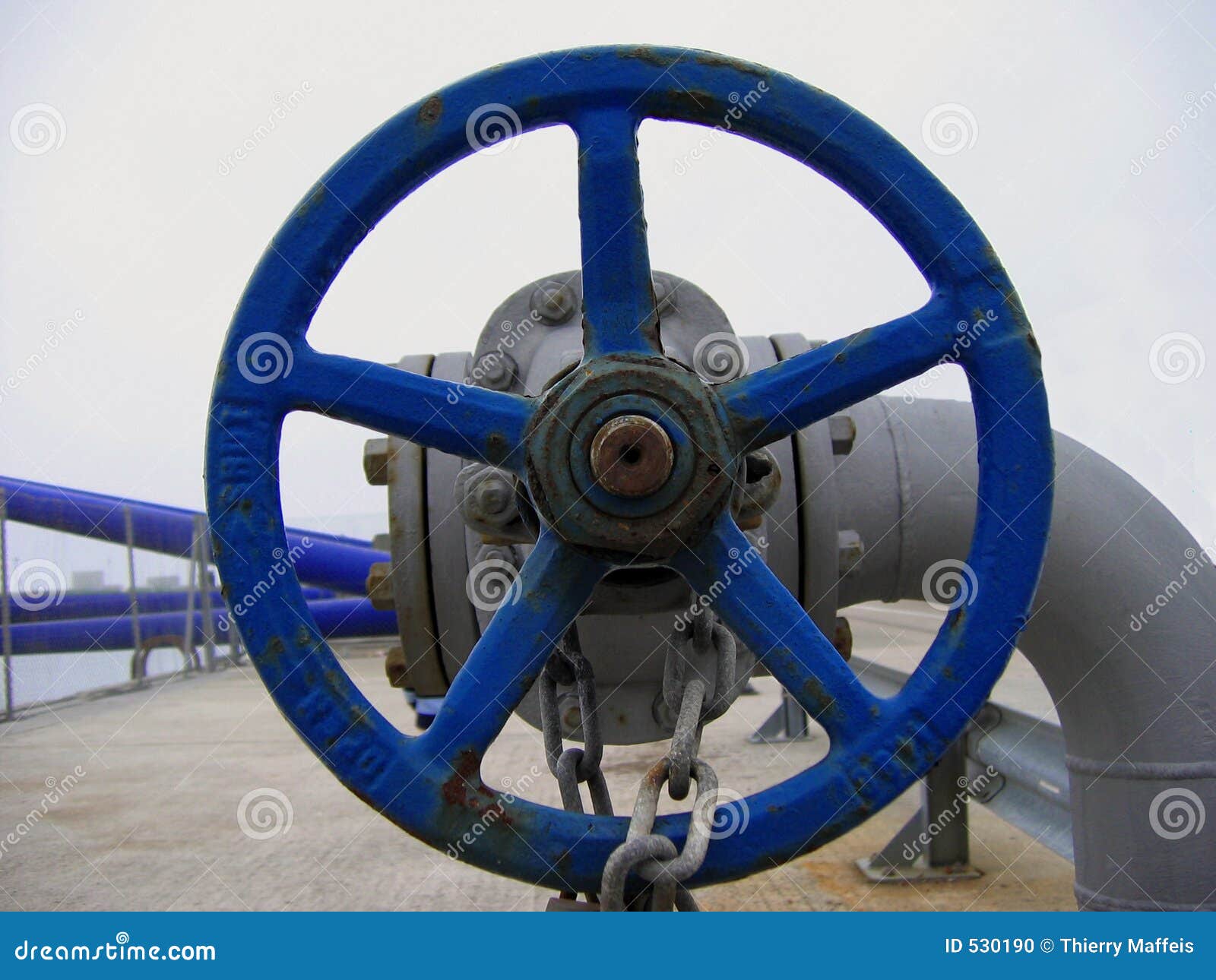 Two Big Blue Tap Or Valve Or Faucet On Water Pipe On Gray Industrial ...