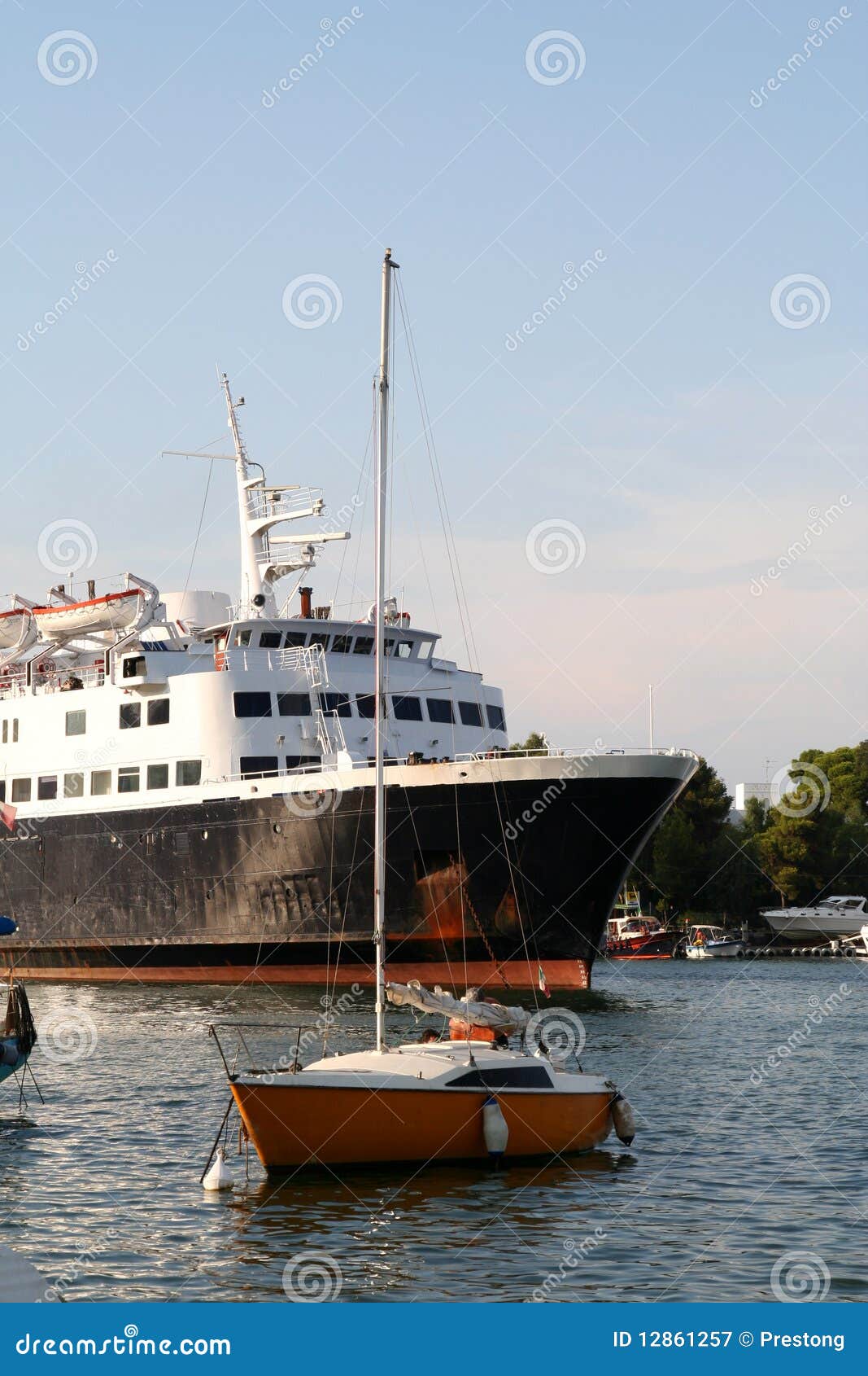 Big Boat, Little Boat. stock image. Image of mooring - 12861257