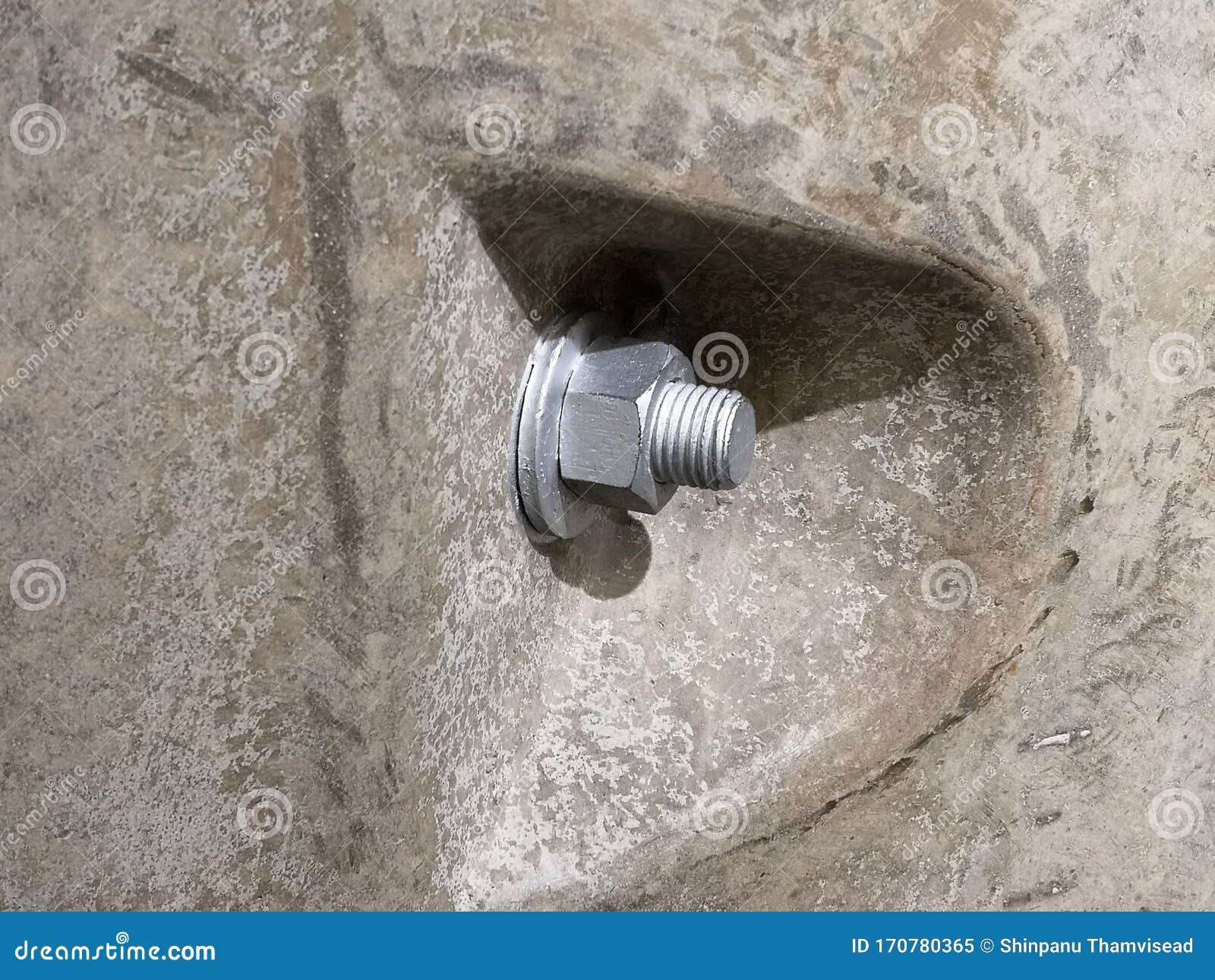 Big Bolt in Grey Concrete Wall for Fastened between the Joints. Stock ...