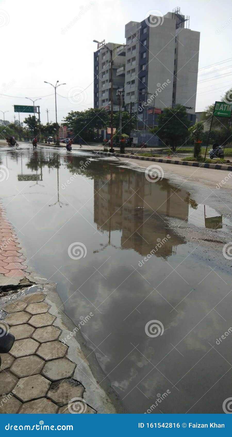 Big Building Reflection in Waterlogged Puddle during Monsoon Editorial ...