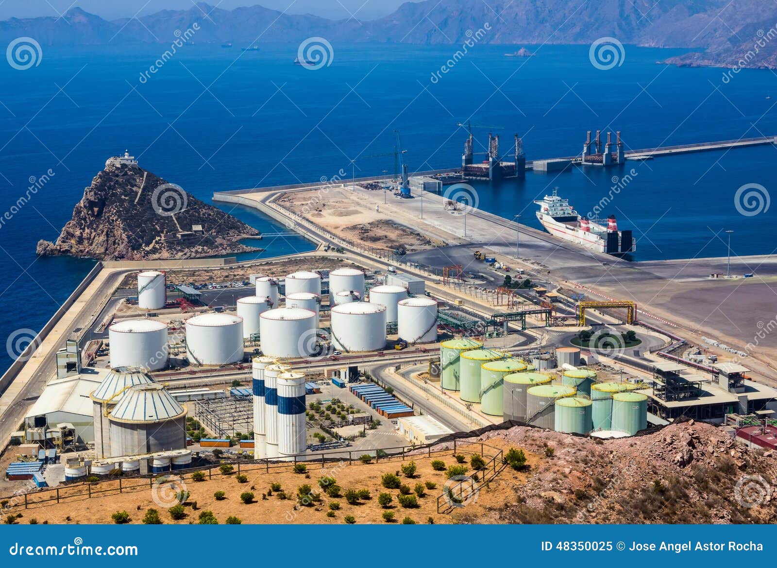 Big Cargo Ship in a Port with a Large Deposit Stock Image - Image of ... Big Cargo Ship in a Port with a Large Deposit Stock Image - Image of ...