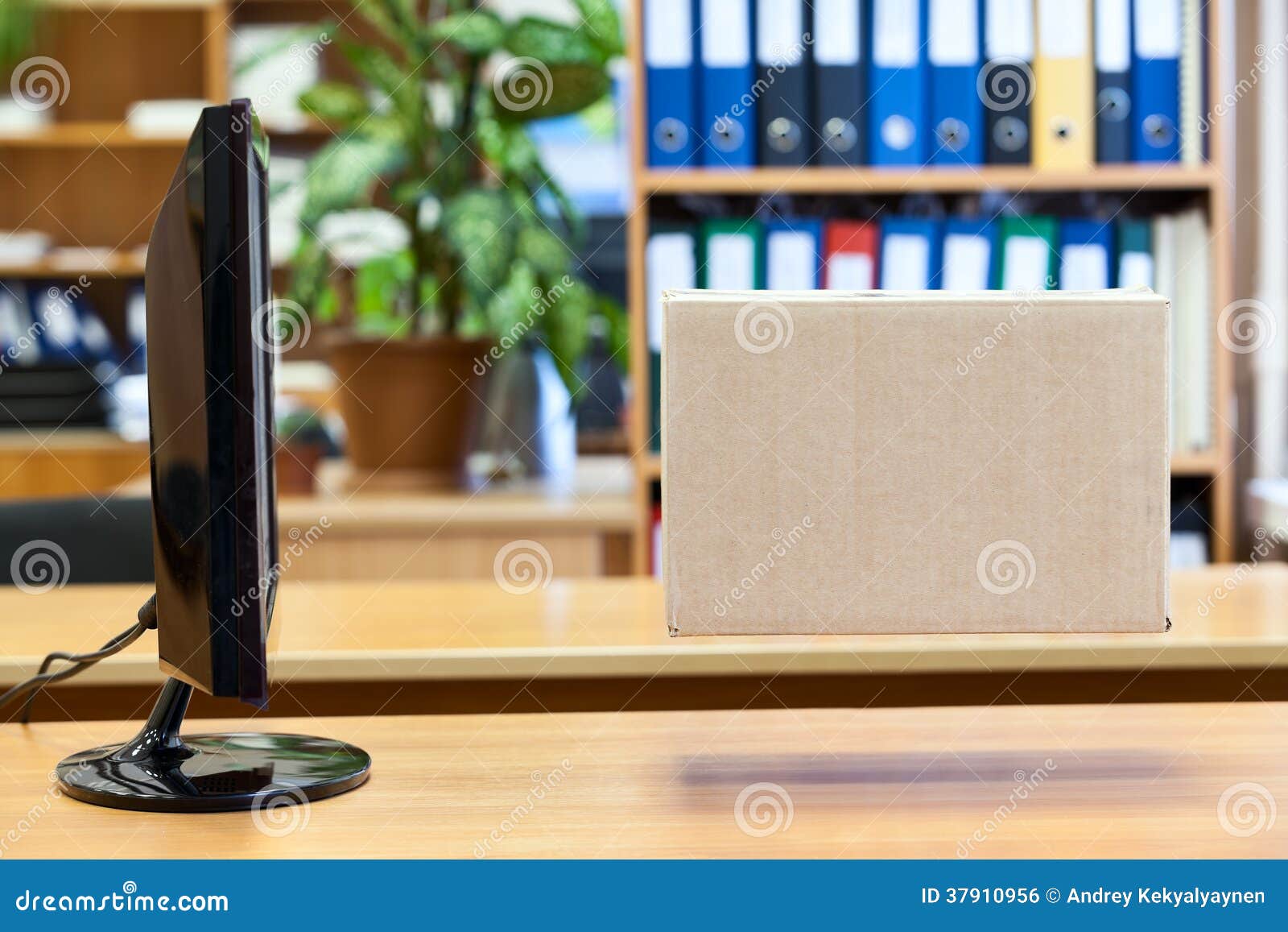 Big Carton Box Hanging in Front of Monitor Stock Photo - Image of ...