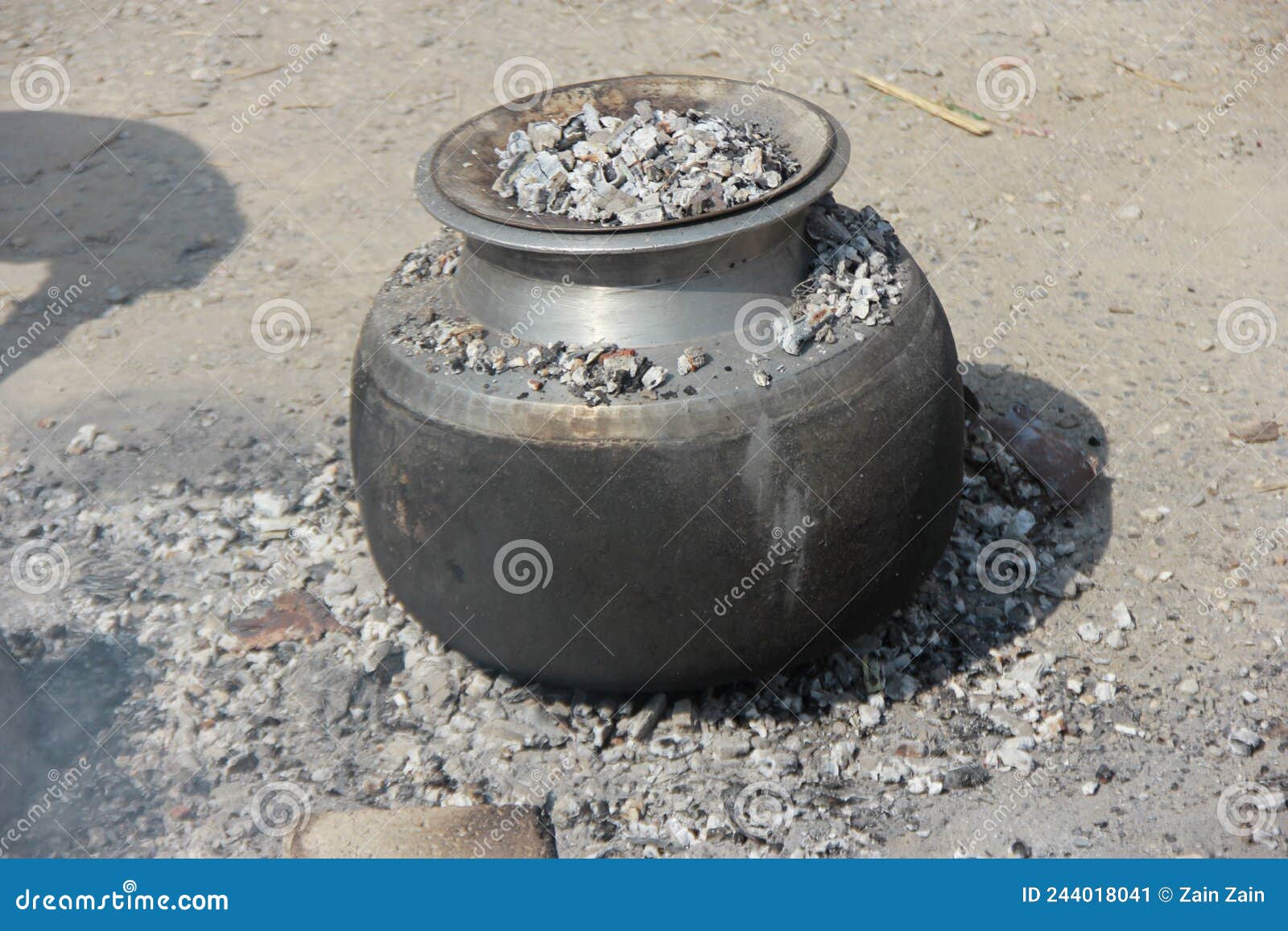 A Big Cauldron Handi Daig on Ground for Cooking Food on Large Scale ...