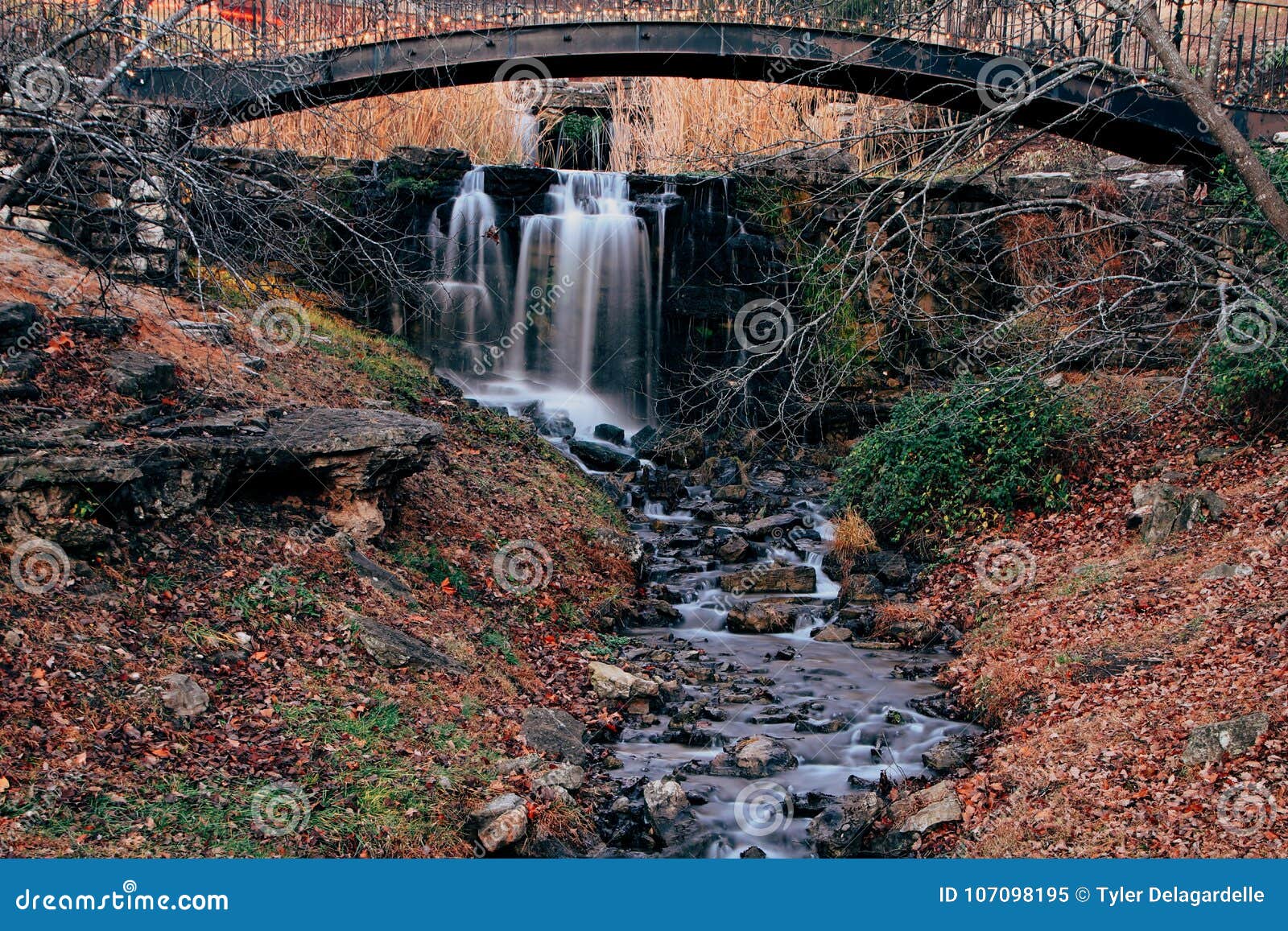 Waterfall under bridge stock image. Image of stream - 107098195