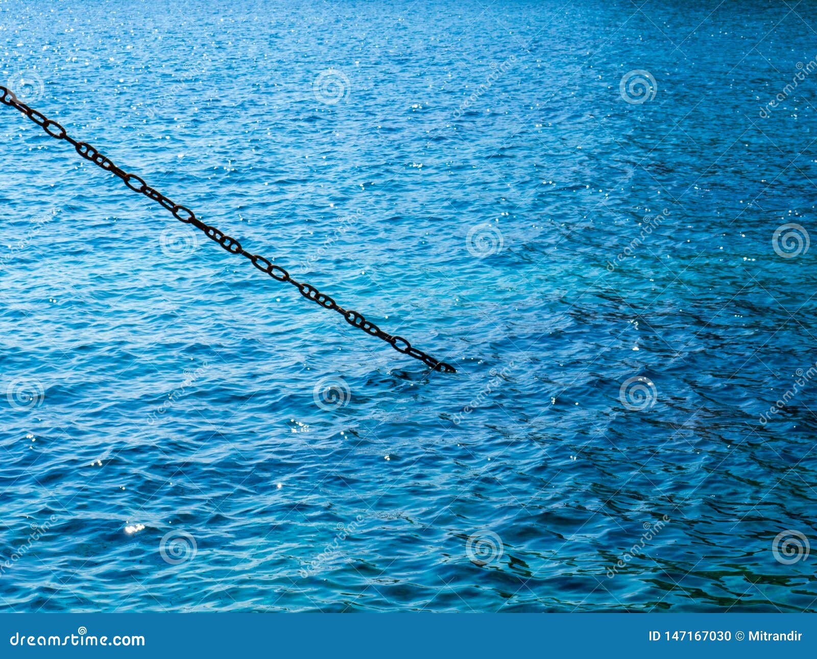 Big Chain and Deep Blue Sea Stock Photo - Image of sand, sunny: 147167030