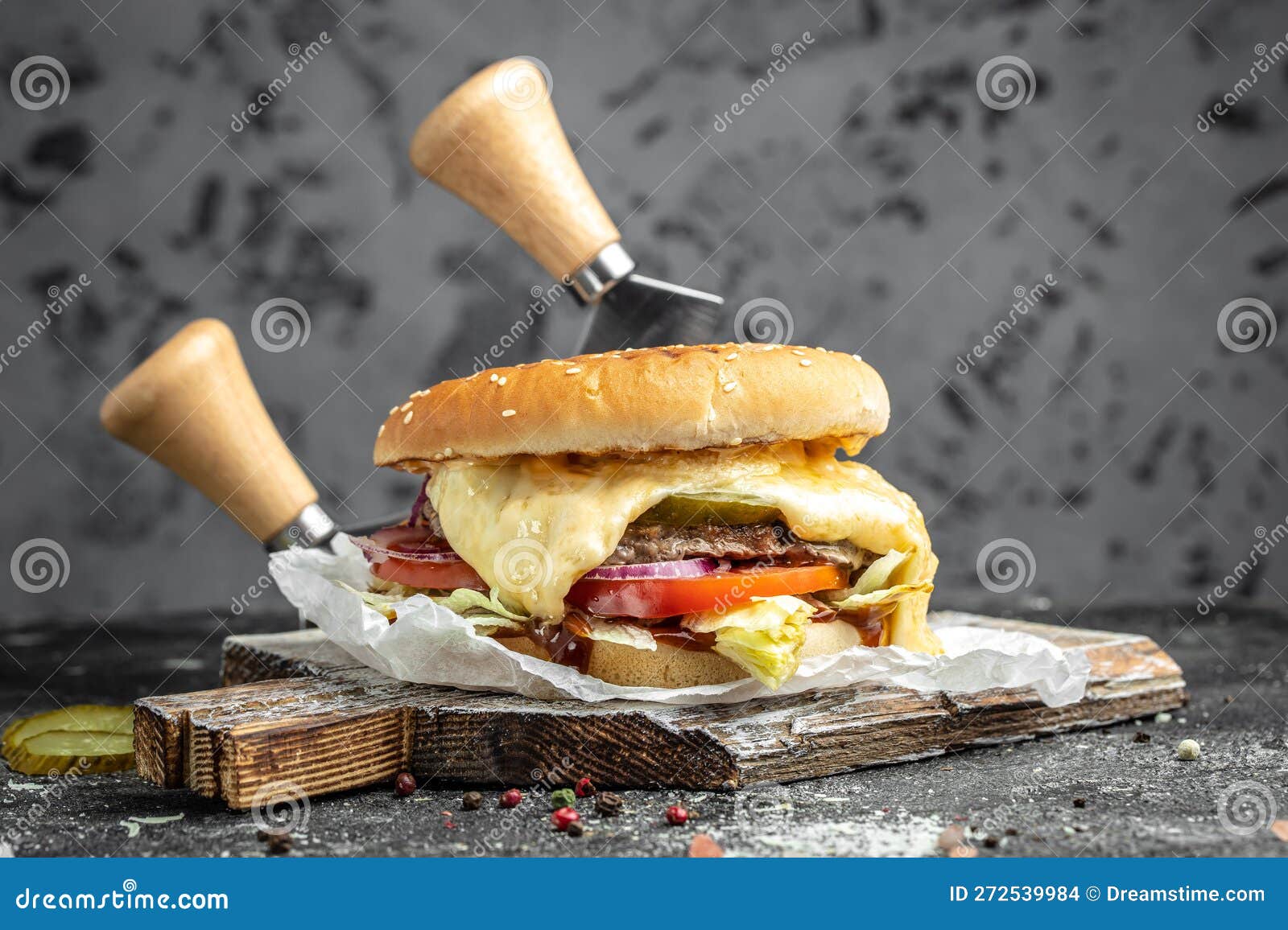 Big Cheeseburger with Melted Cheese. Fast Food Take Away Stock Photo ...
