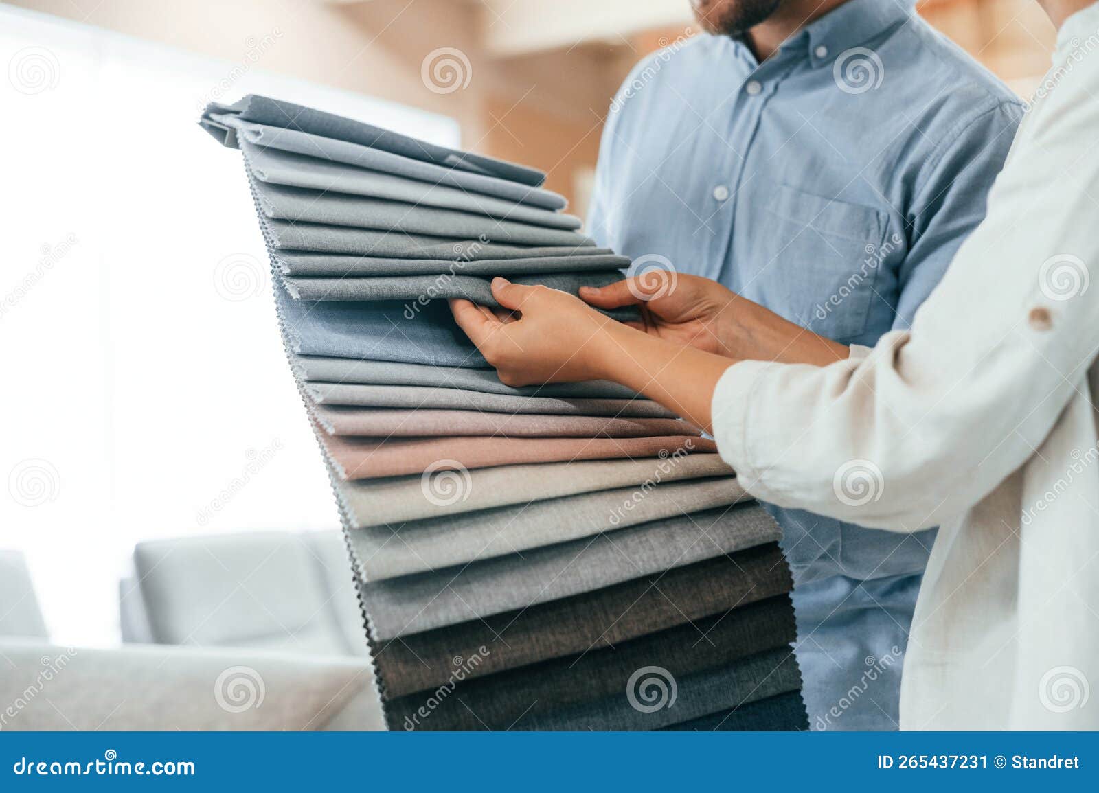 Big Choice of Colors and Materials. Couple Choosing the Sofa and Bed in ...