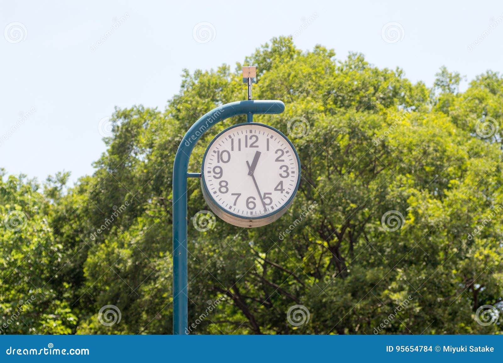 Big clock in a park stock photo. Image of park, time - 95654784
