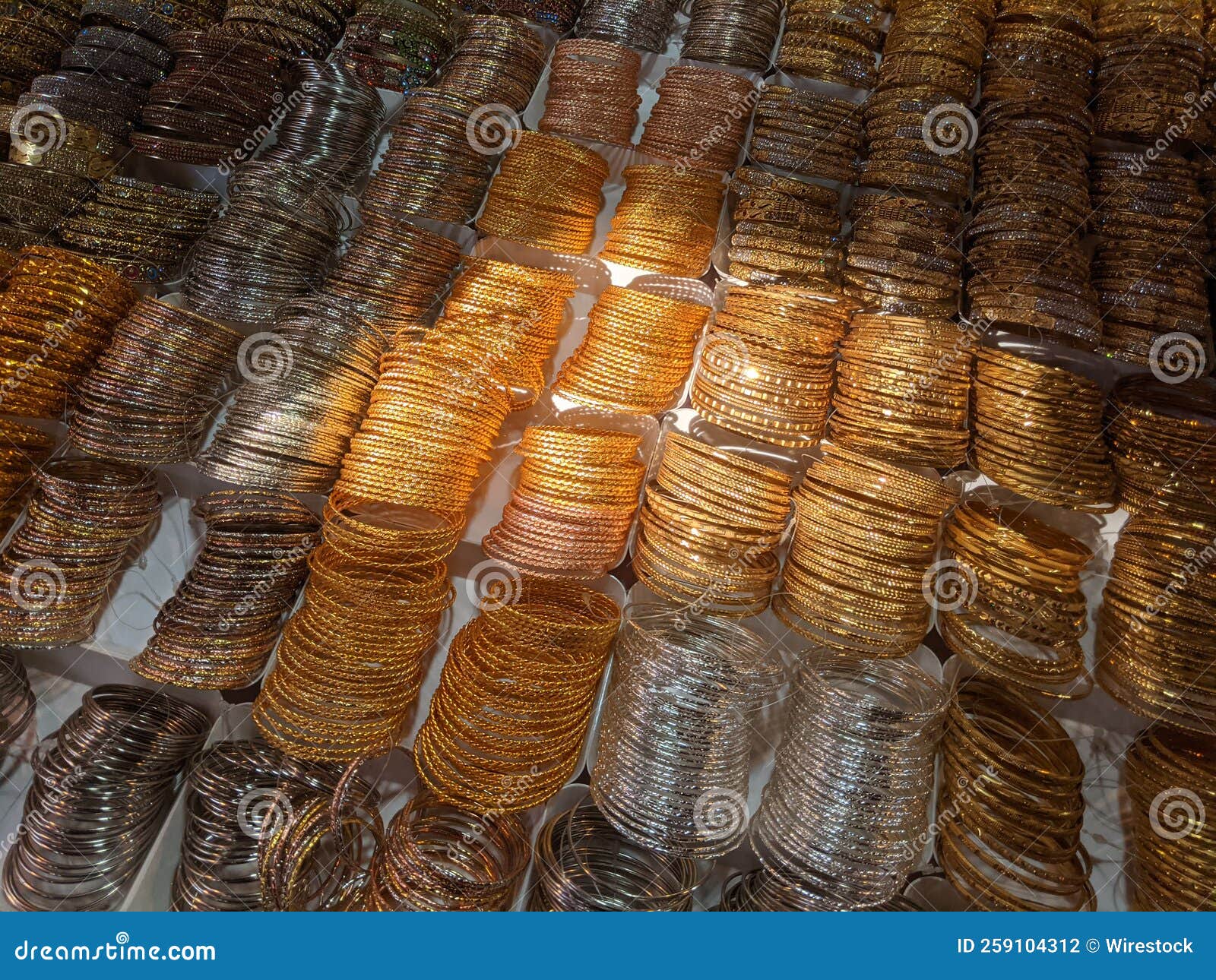 Big Collection of Shiny Gold and Silver Bangles Stock Photo - Image of ...