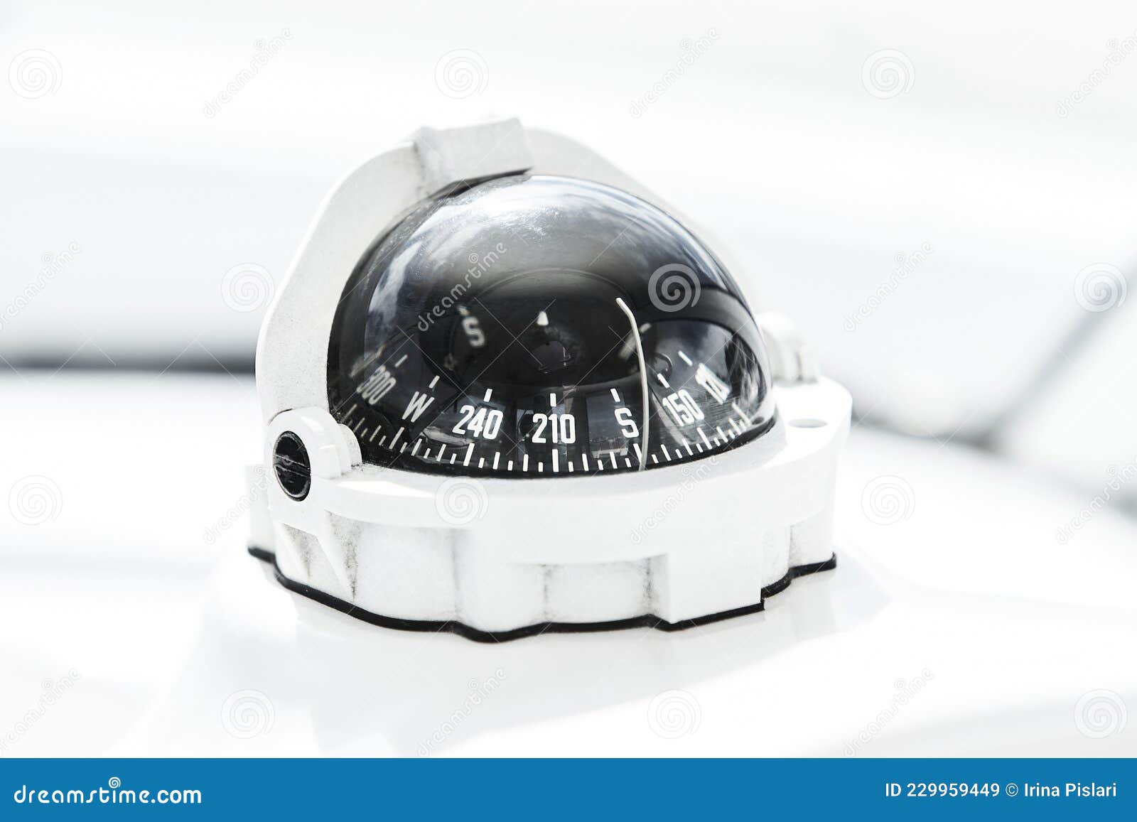 A Big Compass On A Boat Showing Direction. Harbor Background. Royalty ...