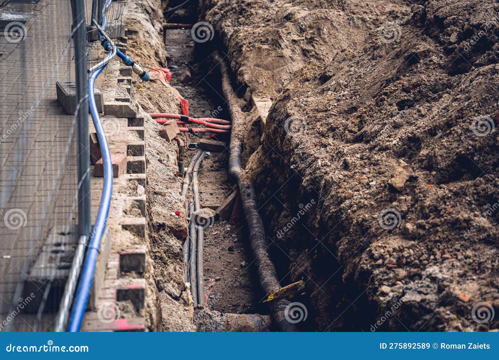 Big Construction Site with Pipes and Wires in the Construction Area ...