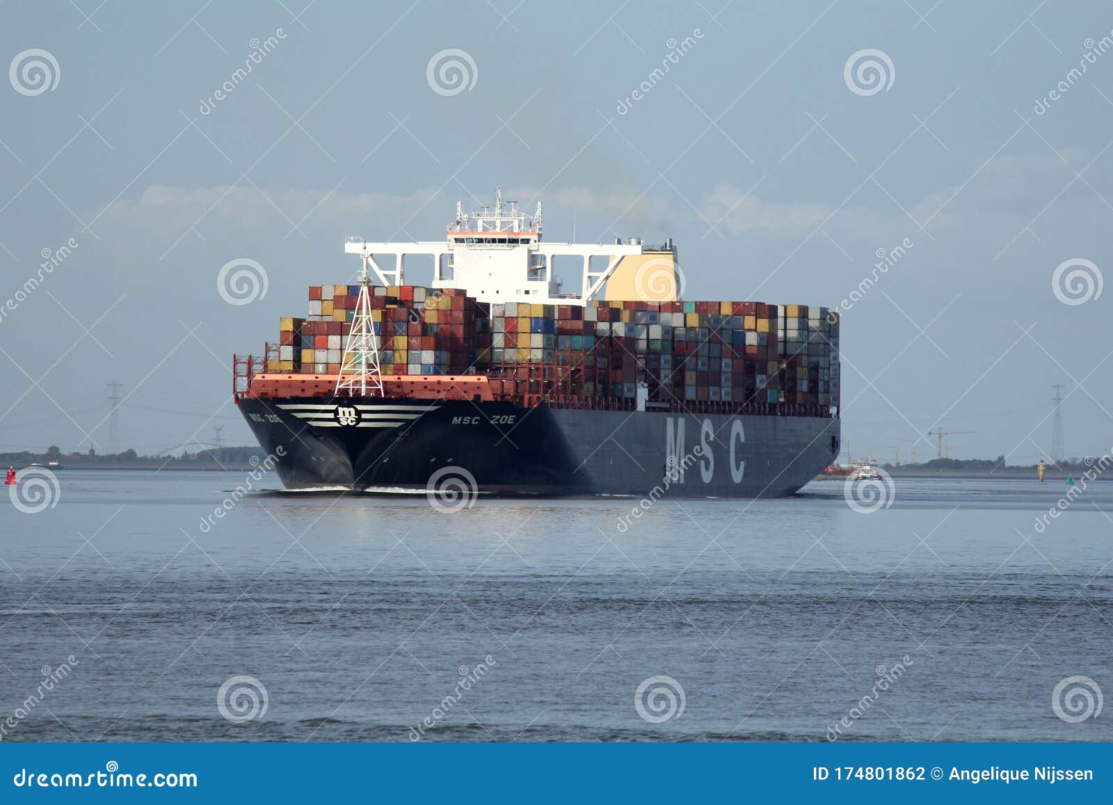 A Big Container Ship is Navigating through the Sea Editorial ...