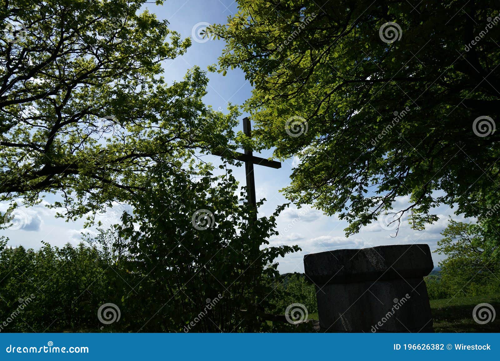 Big Cross Statue in the Field Surrounded by Greens and Trees Stock ...