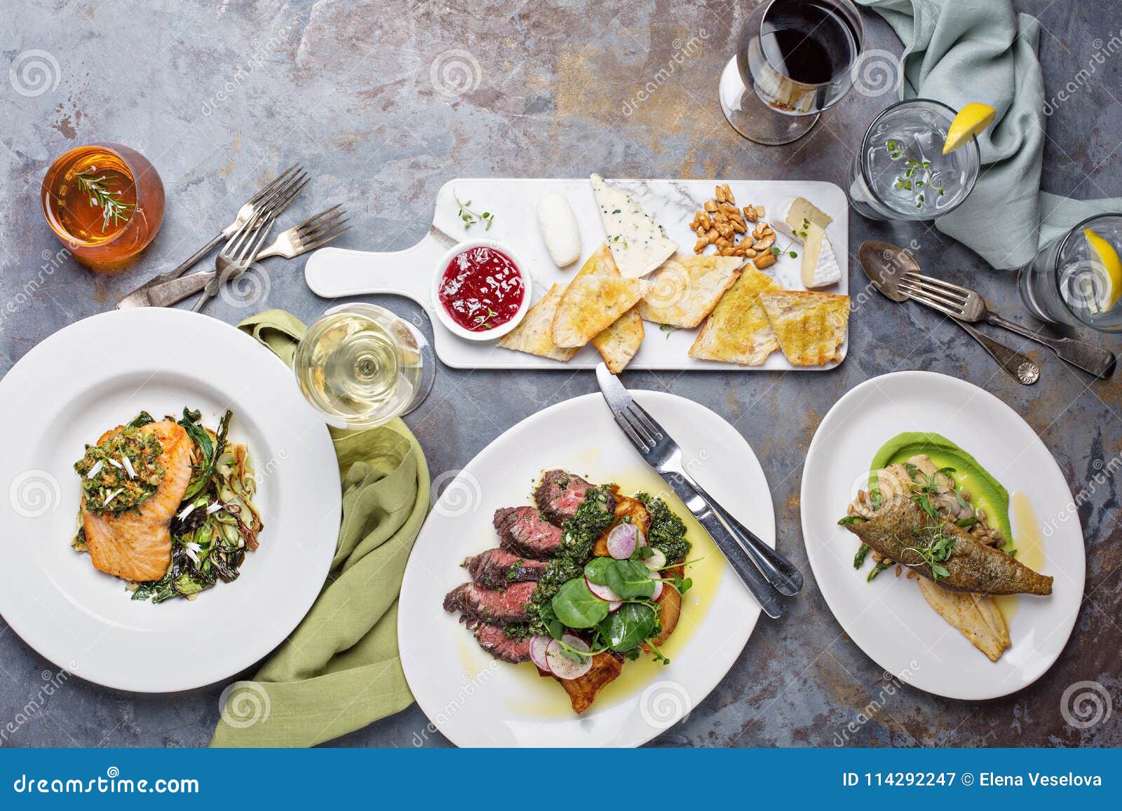 Big Dinner Table Overhead View with Steak and Fish Stock Image - Image ...