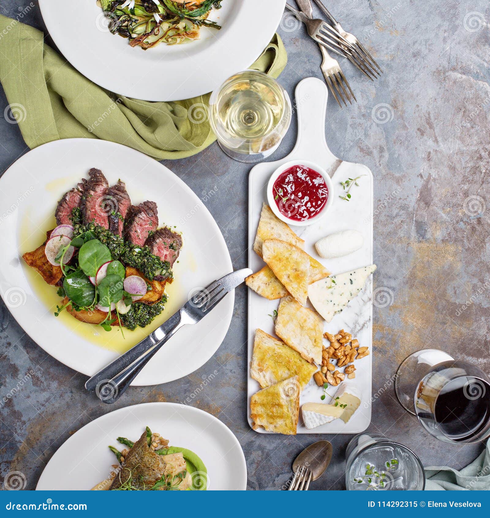 Big Dinner Table Overhead View with Steak and Fish Stock Image - Image ...