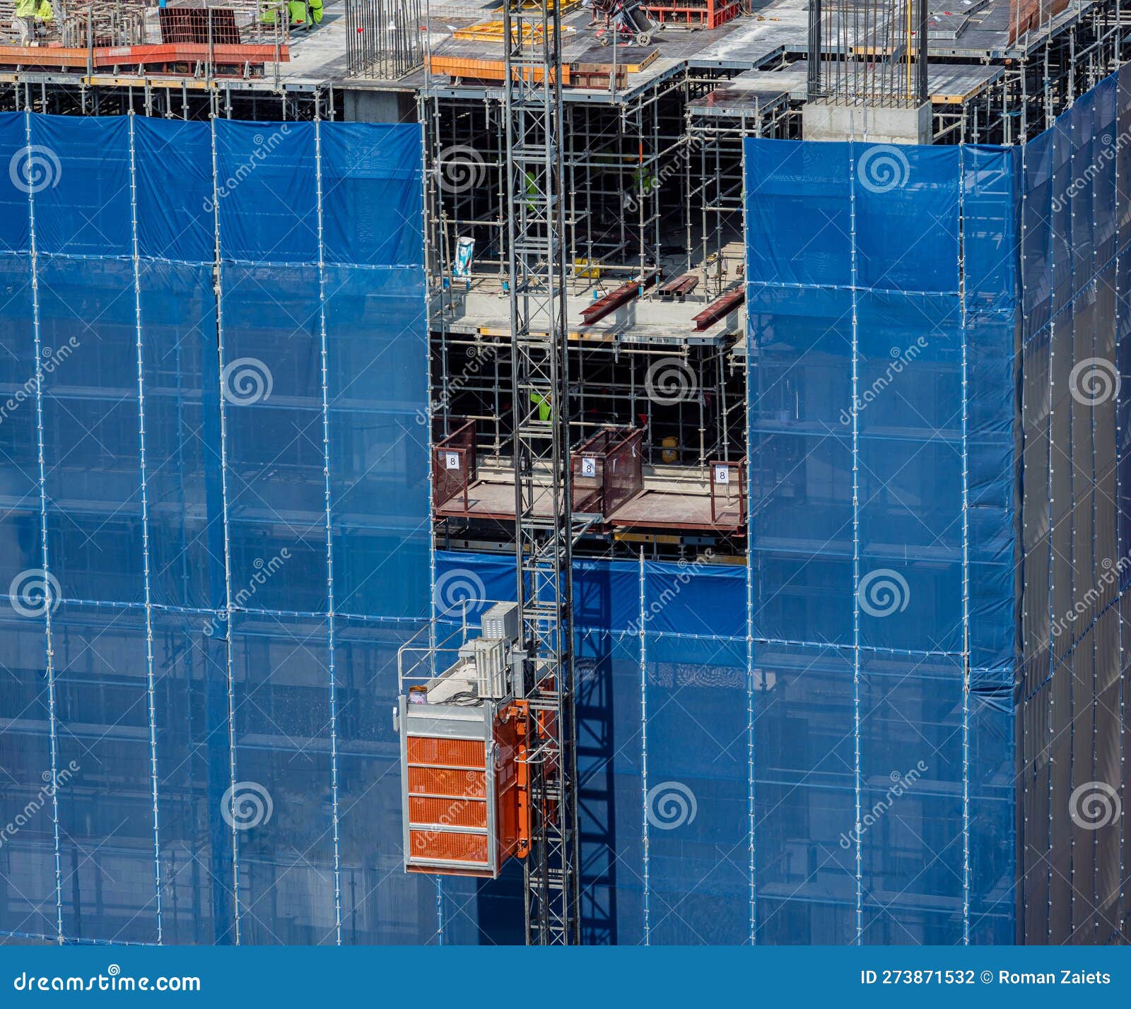Big Elevator on the Exterior of a New Building Construction Stock Photo ...