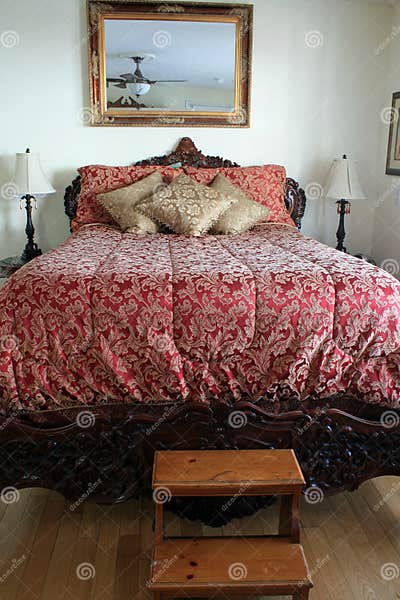 Big fancy bed stock image. Image of comforter, reflection - 3620785