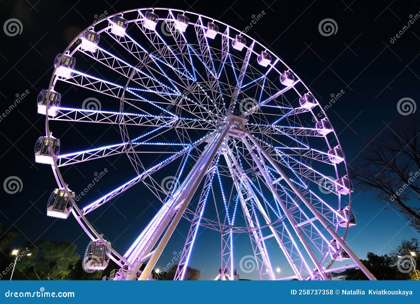 Big Ferris Wheel at Night, Glowing with Lights at Night Stock Photo ...