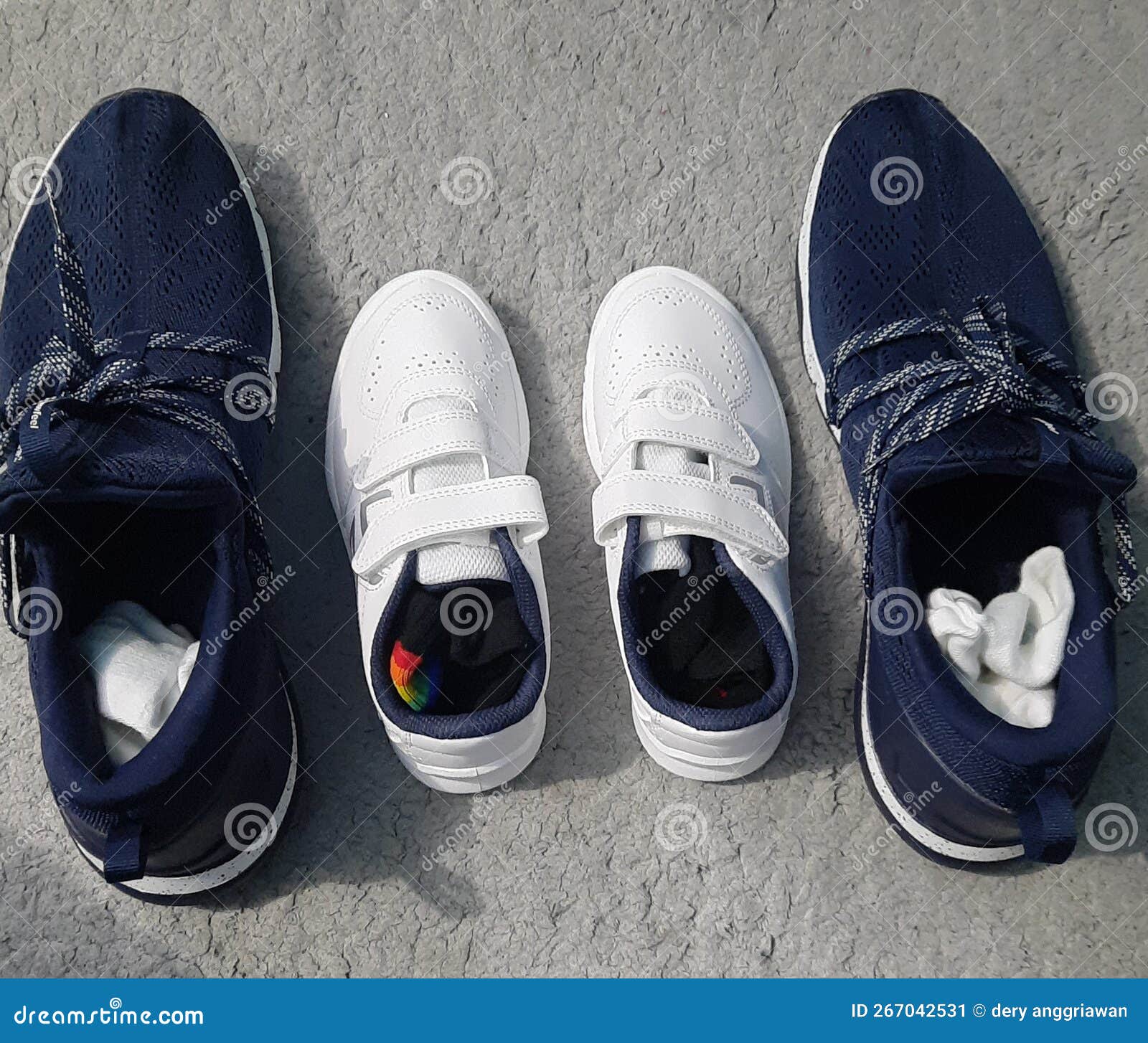 Big Foot Daddy Vs Little Foot Son Stock Image - Image of little, daddy ...