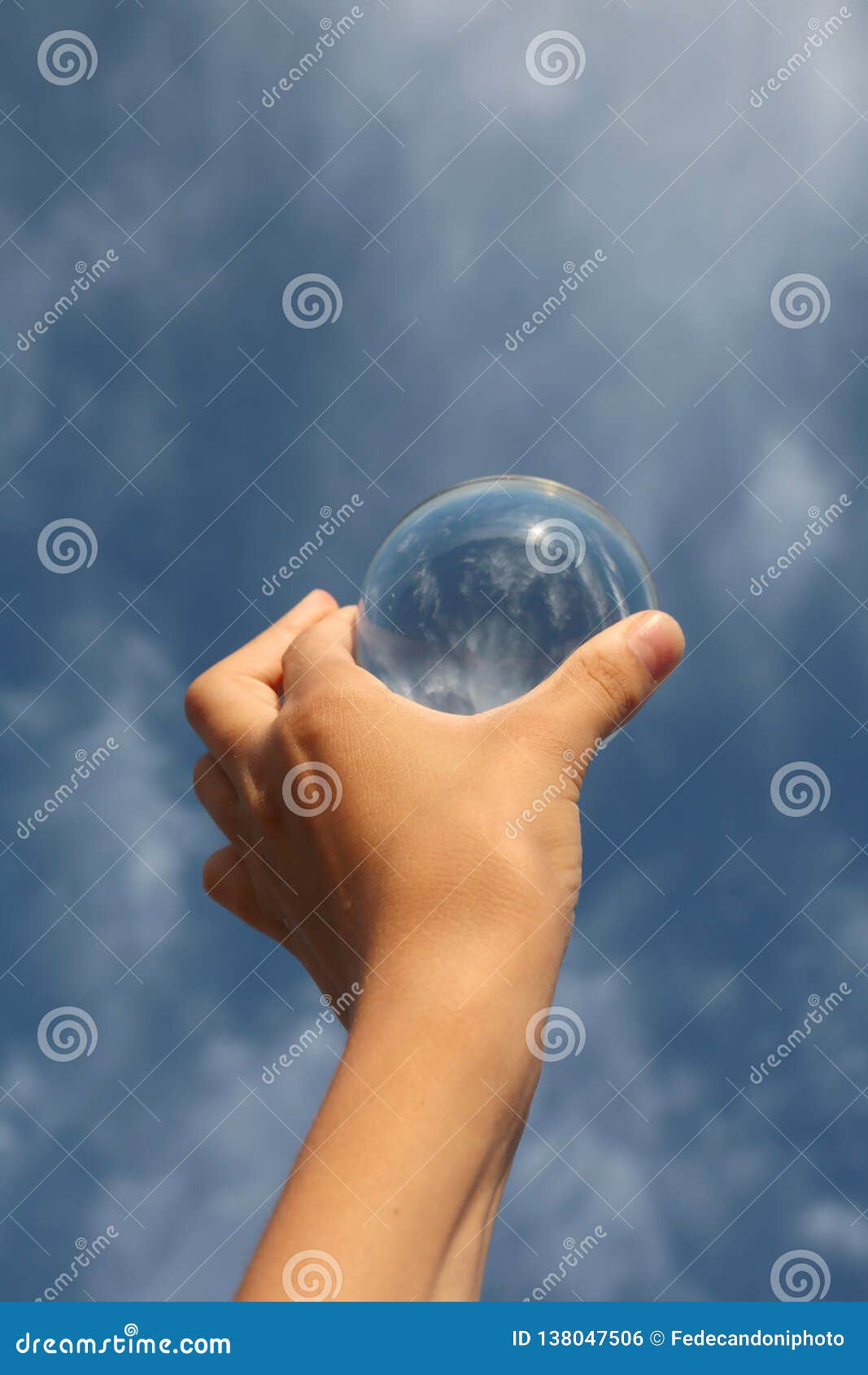 Big Glass Sphere and a Hand of a Child Stock Photo - Image of ...