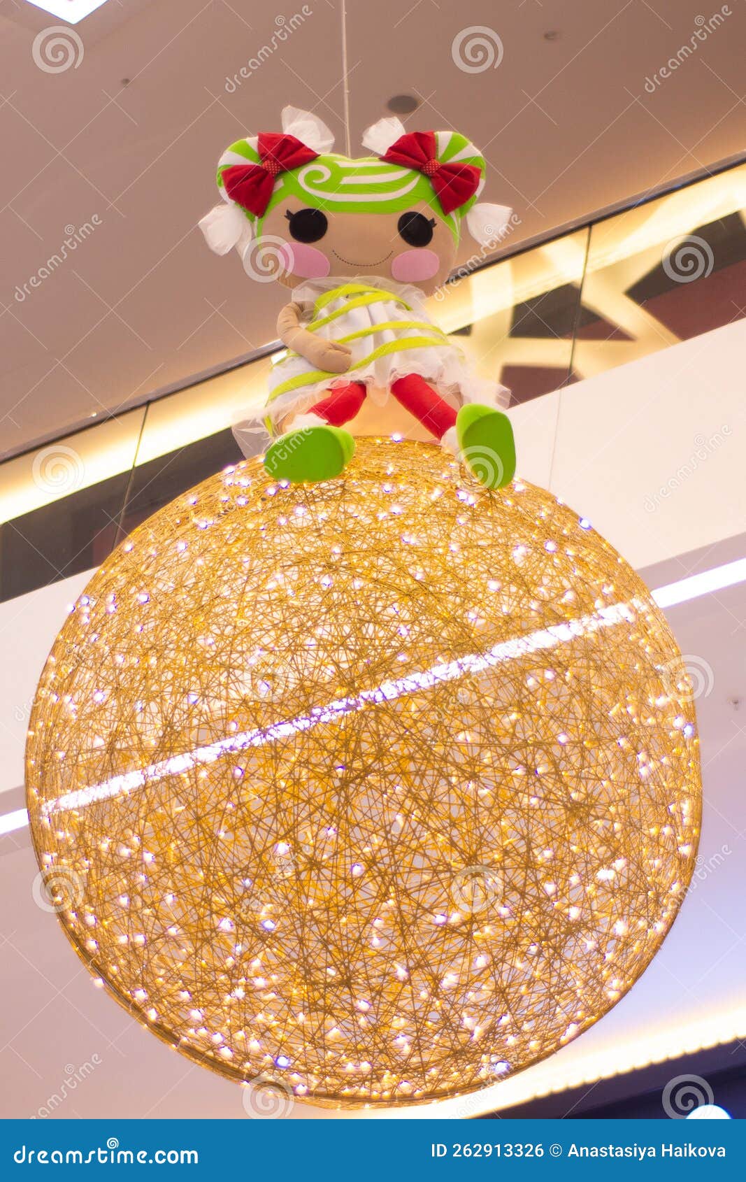 Big Glowing Golden Ball with a Doll Stock Photo - Image of girl, year ...