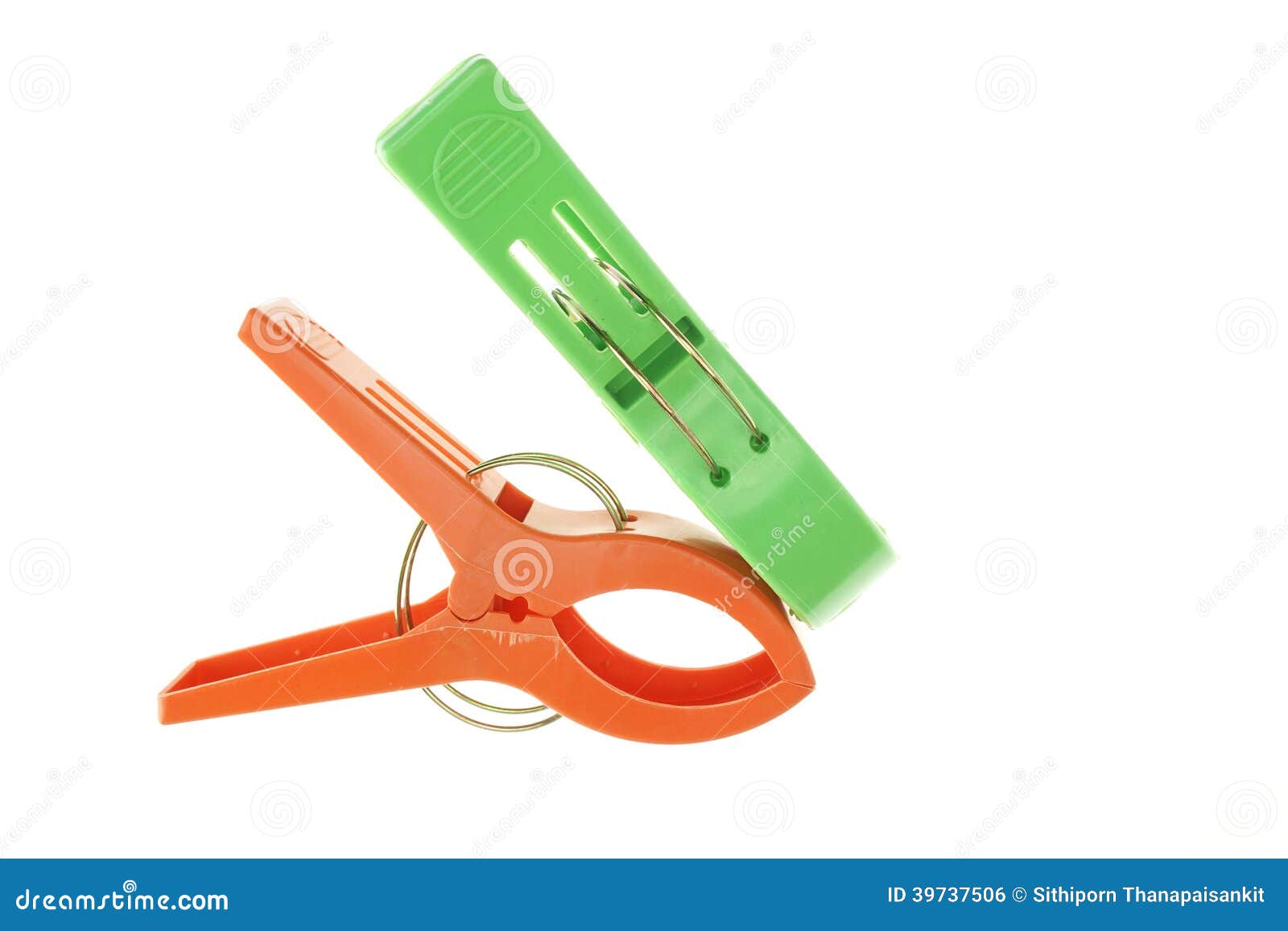 Big Green and Orange Clothes Pegs Isolated Stock Photo - Image of ...