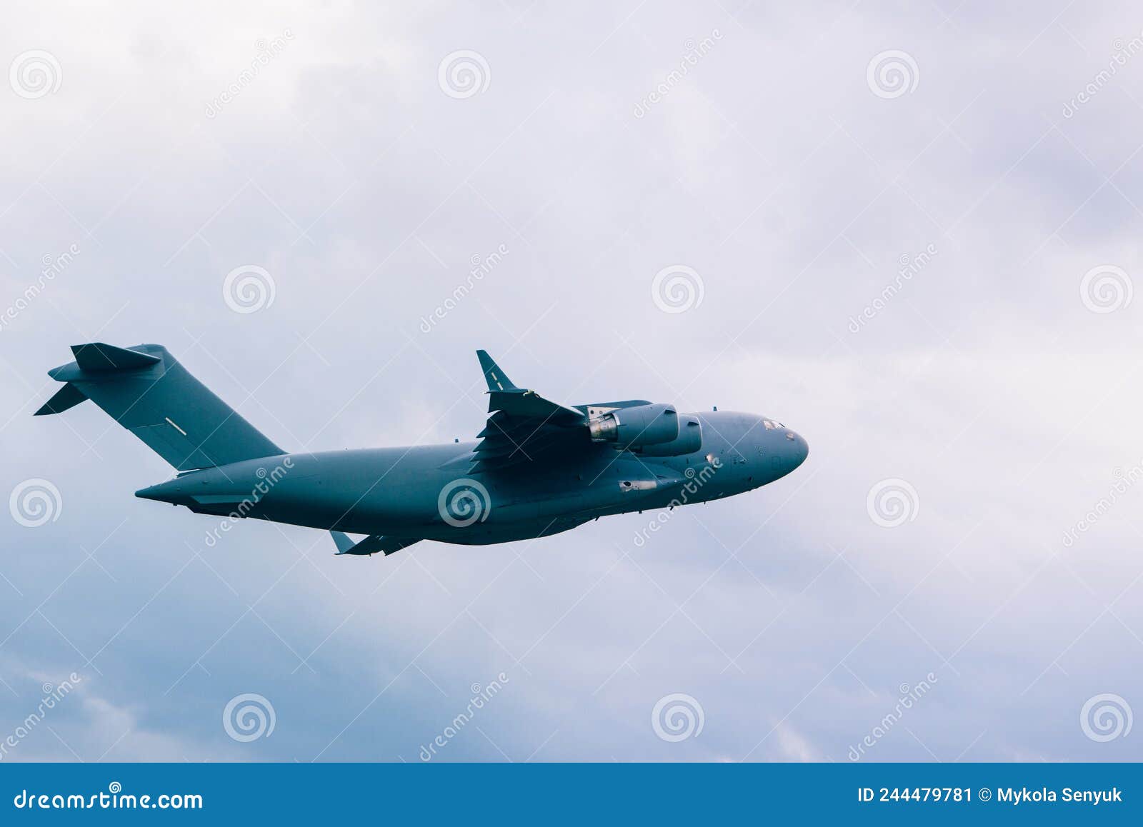 Big Grey Plane in a Cloudy Sky. without Identification Marks Stock ...
