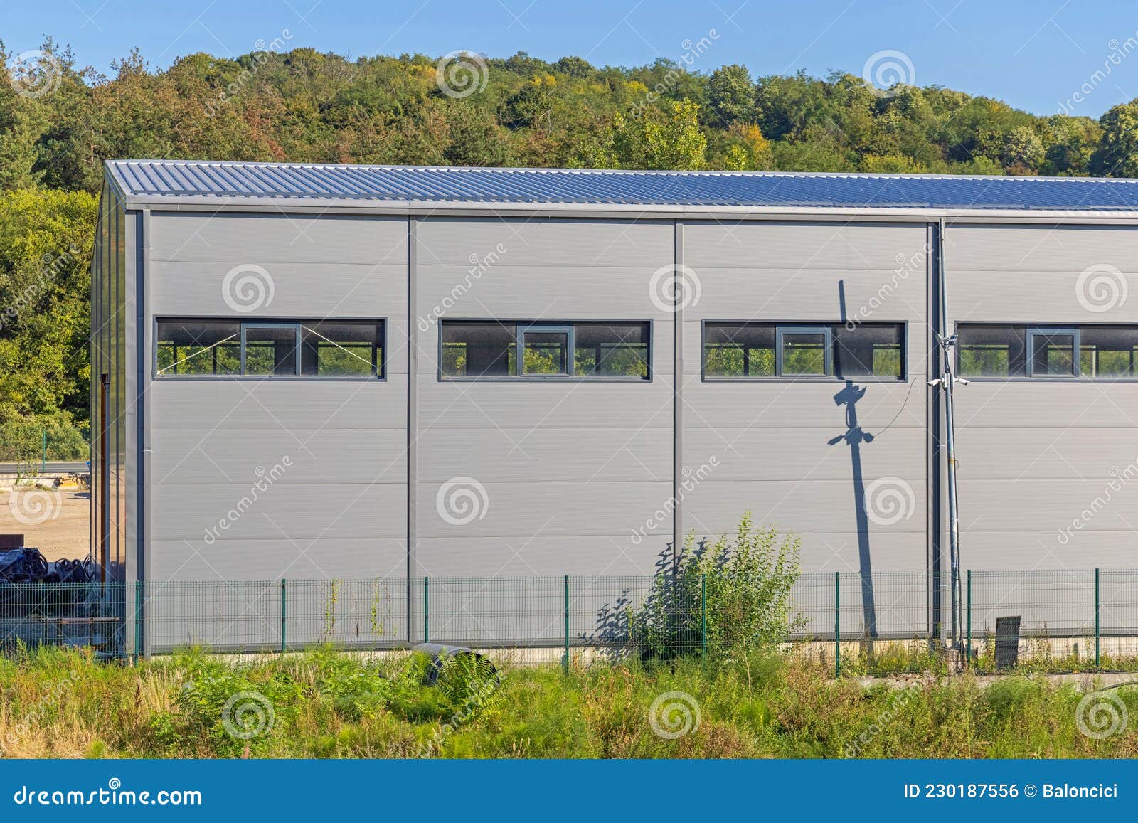 Big Warehouse Building stock photo. Image of fence, industrial - 230187556