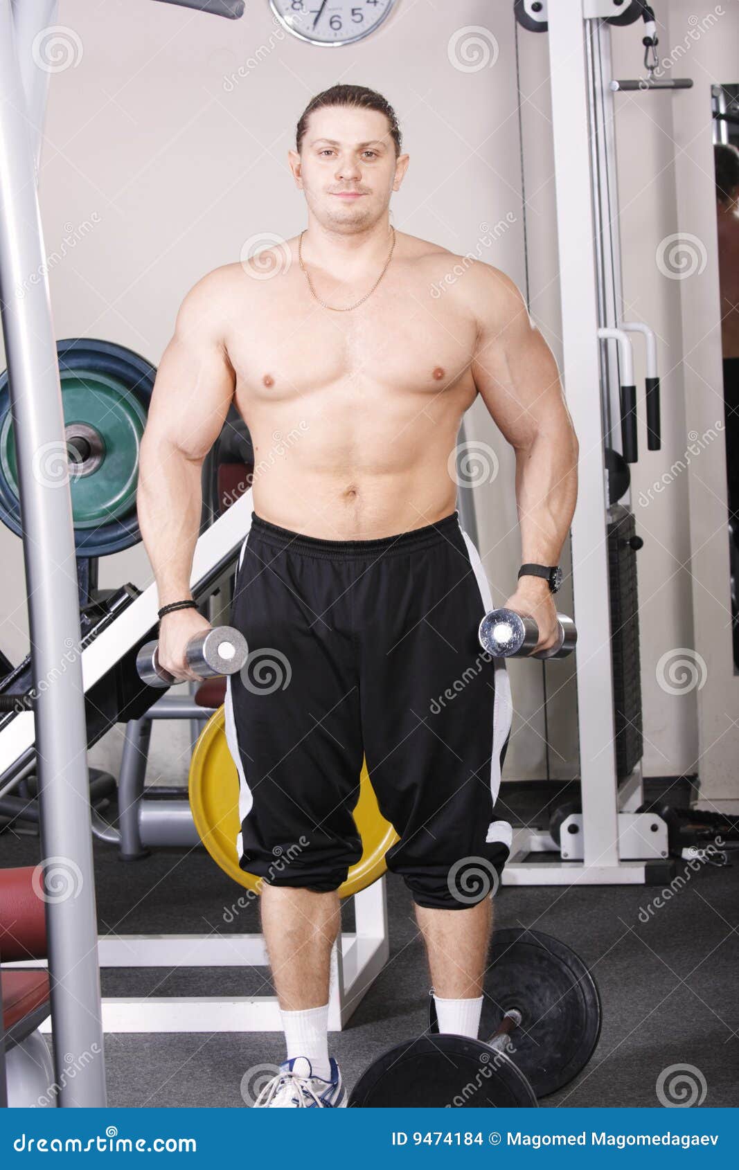 Big guy with dumbbells stock photo. Image of indoors, healthy - 9474184