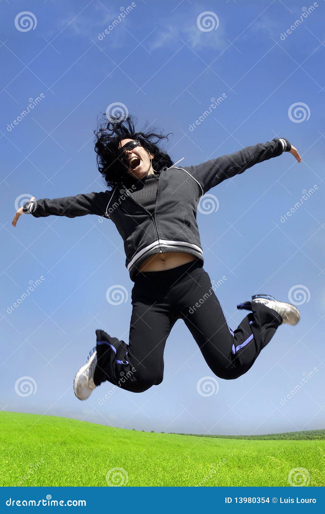Big happy jump stock photo. Image of grass, blue, happy - 13980354