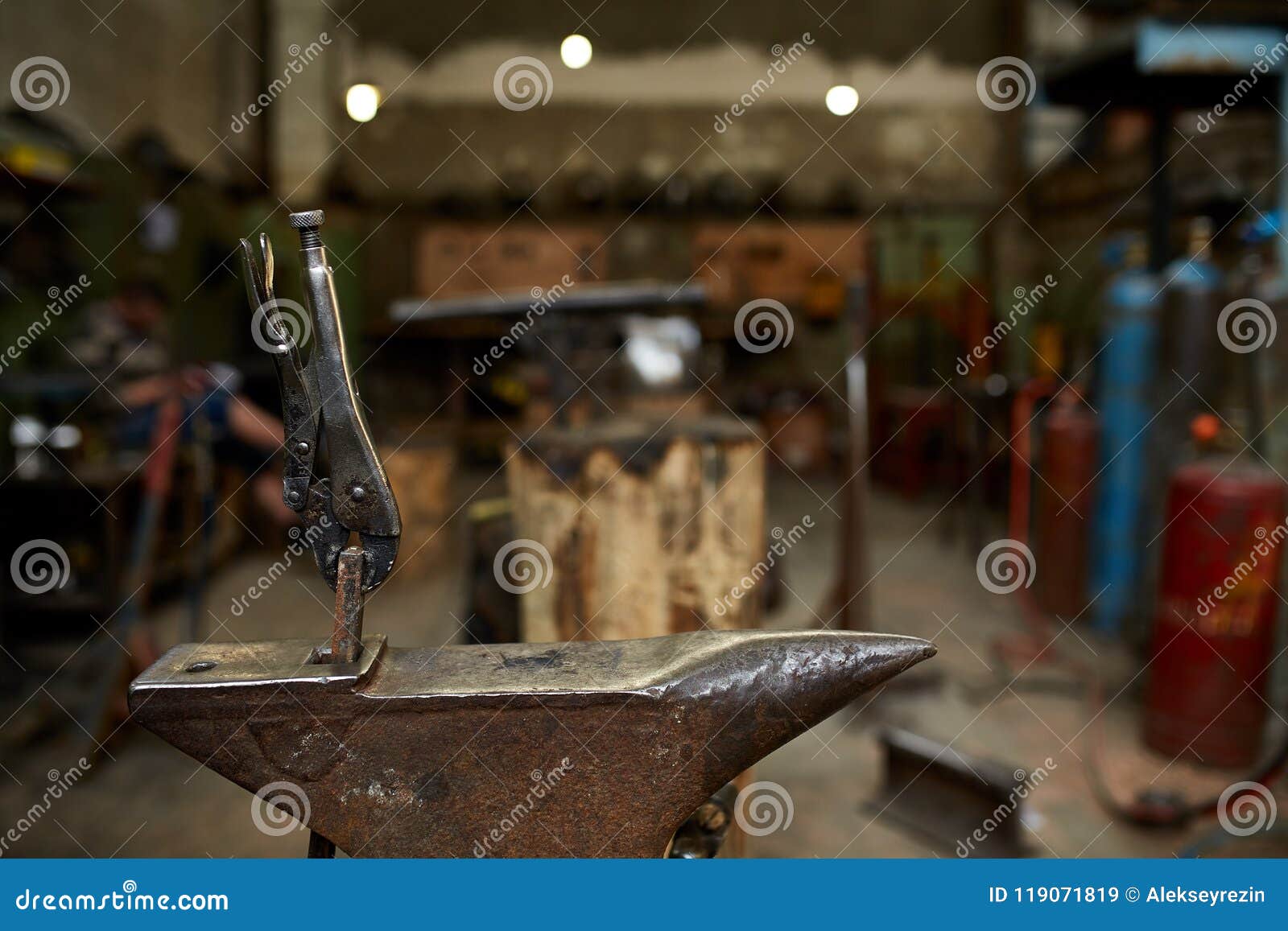 Big Heavy Anvil and Pliers in the Blacksmith`s Workshop, Close-up ...