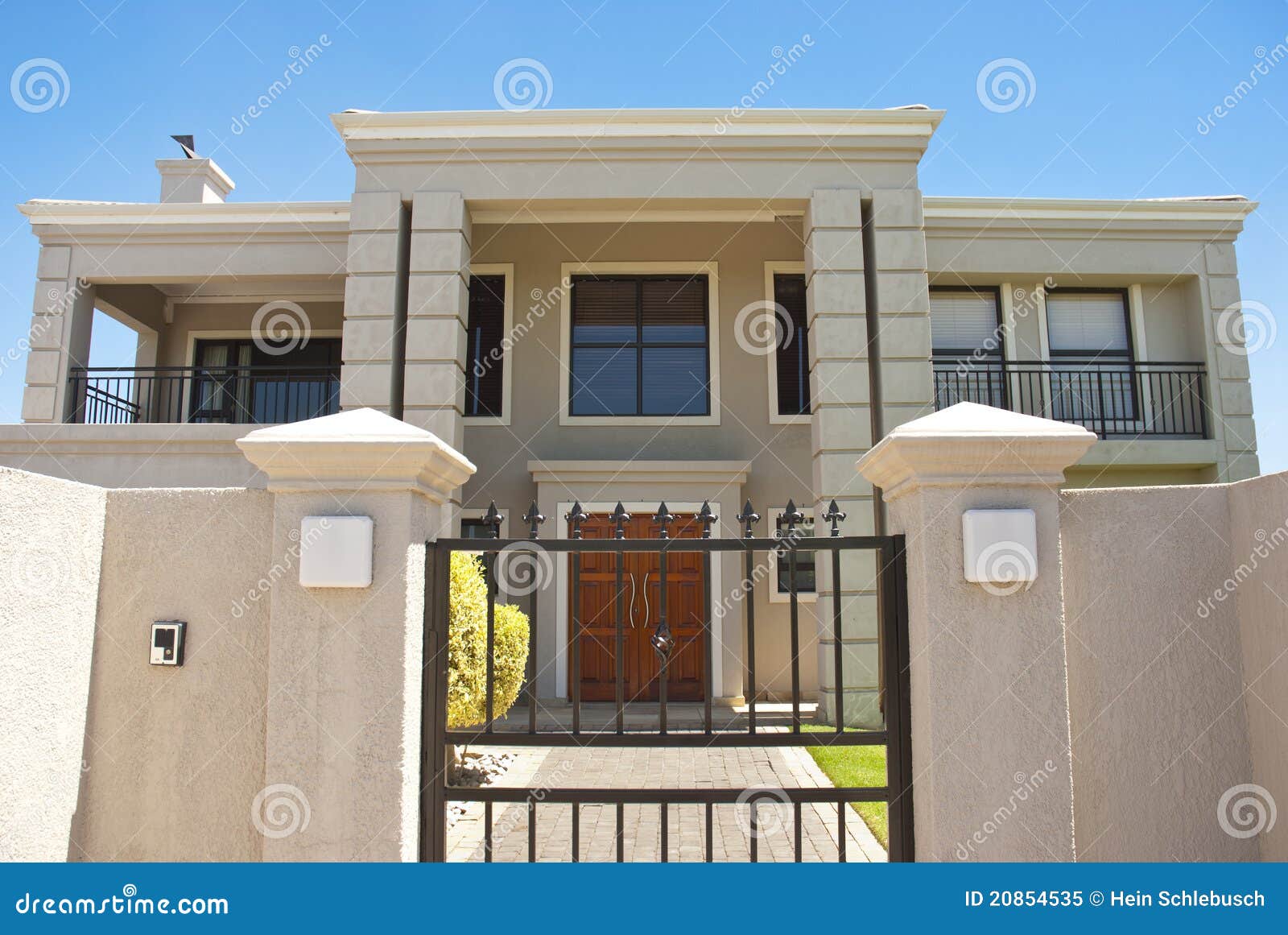 Big house behind gate stock image. Image of landscaping - 20854535